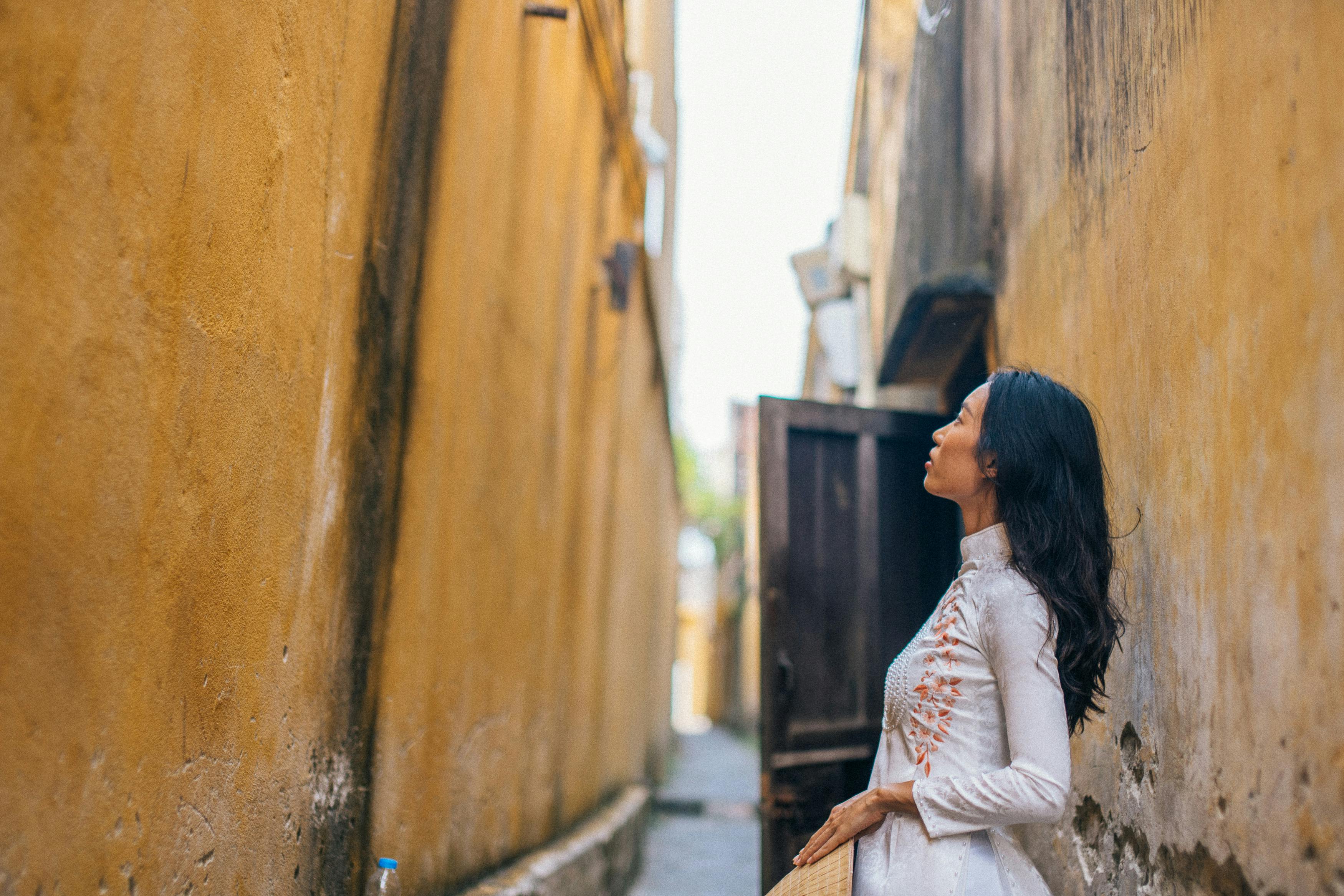 Woman Looking at the Wall · Free Stock Photo
