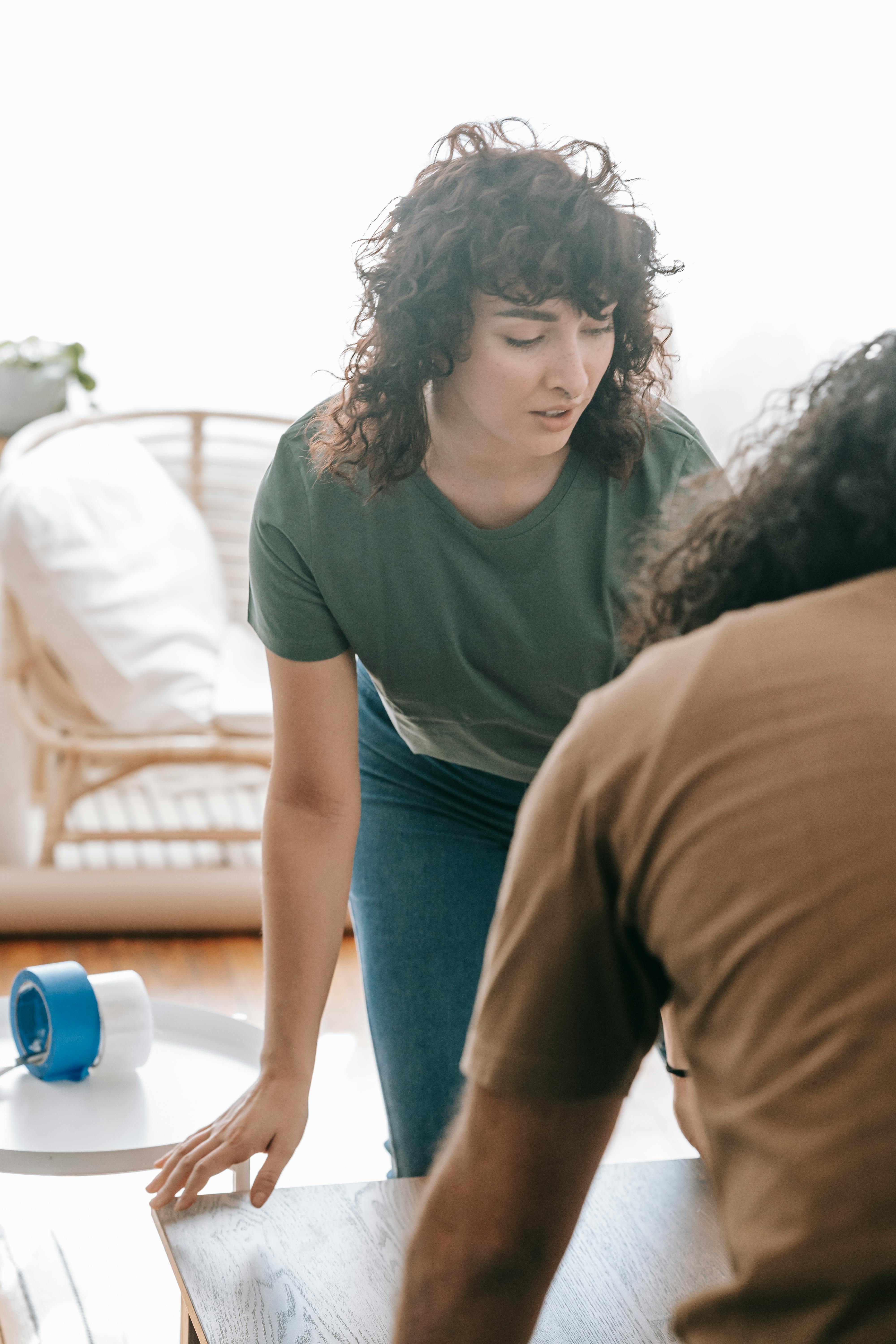 People Moving Around A Table Photos, Download The BEST Free People ...