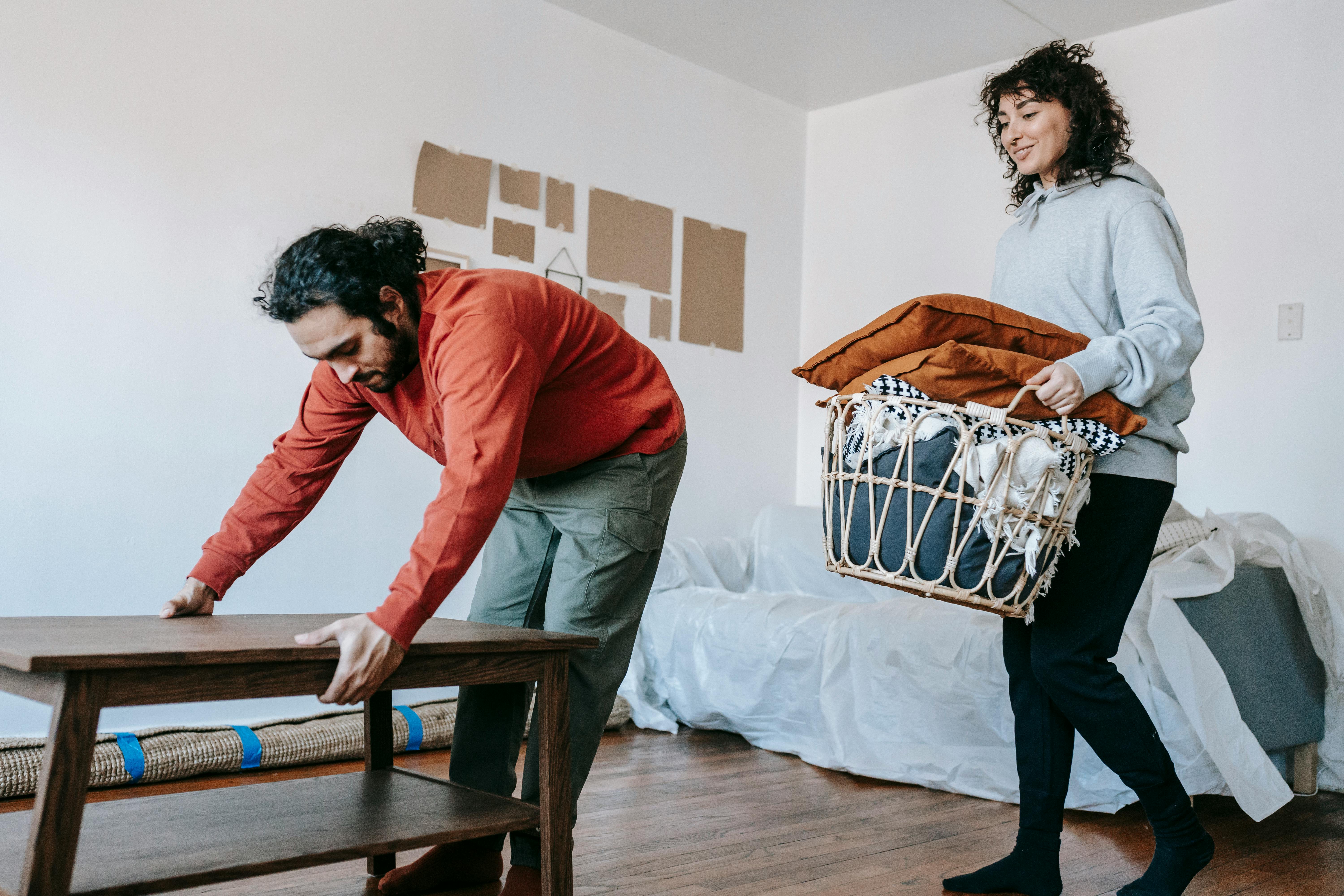 Couple Packing Up Things In The House · Free Stock Photo
