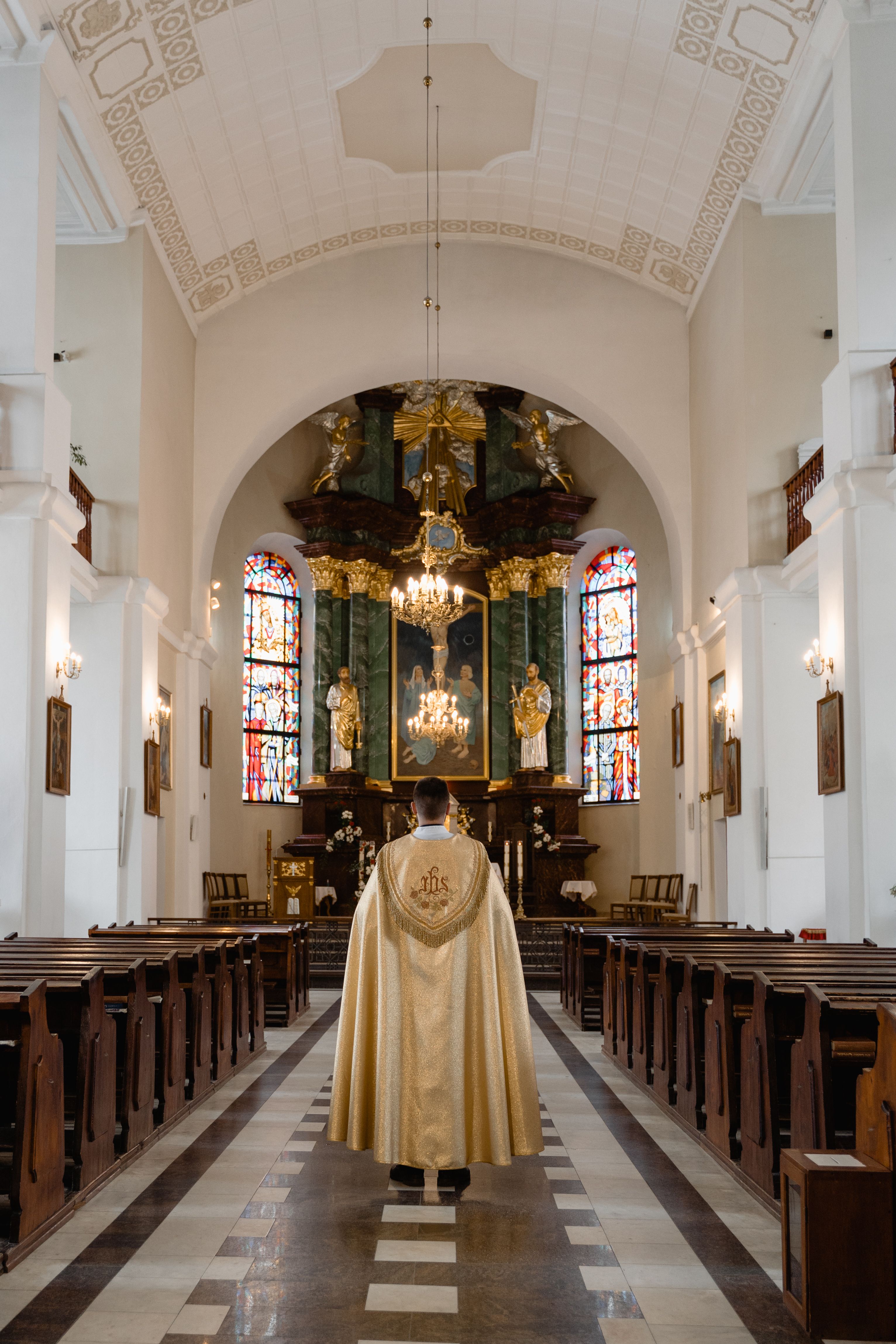 A Priest inside a Church · Free Stock Photo