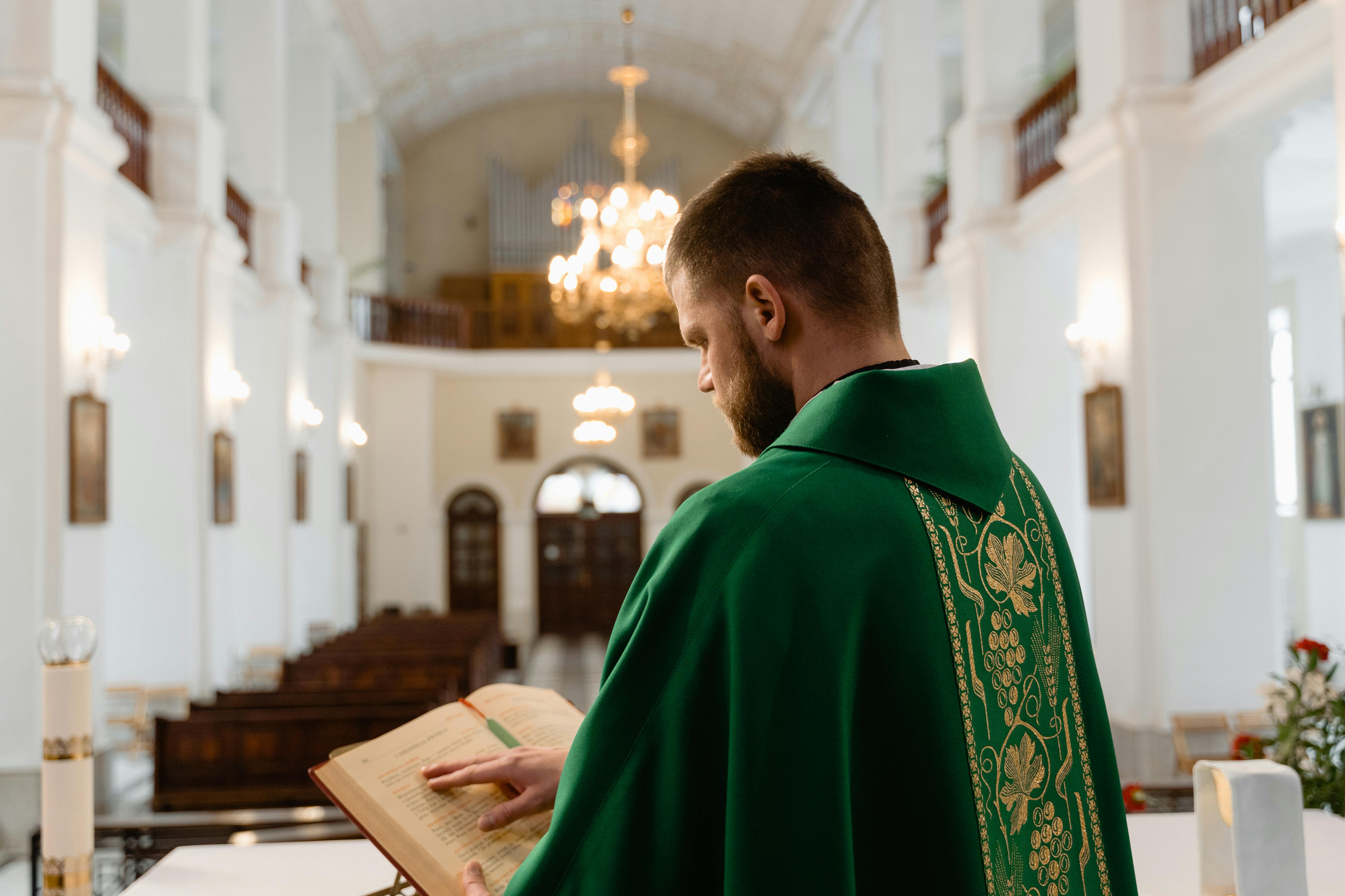 A Priest at the Altar · Free Stock Photo