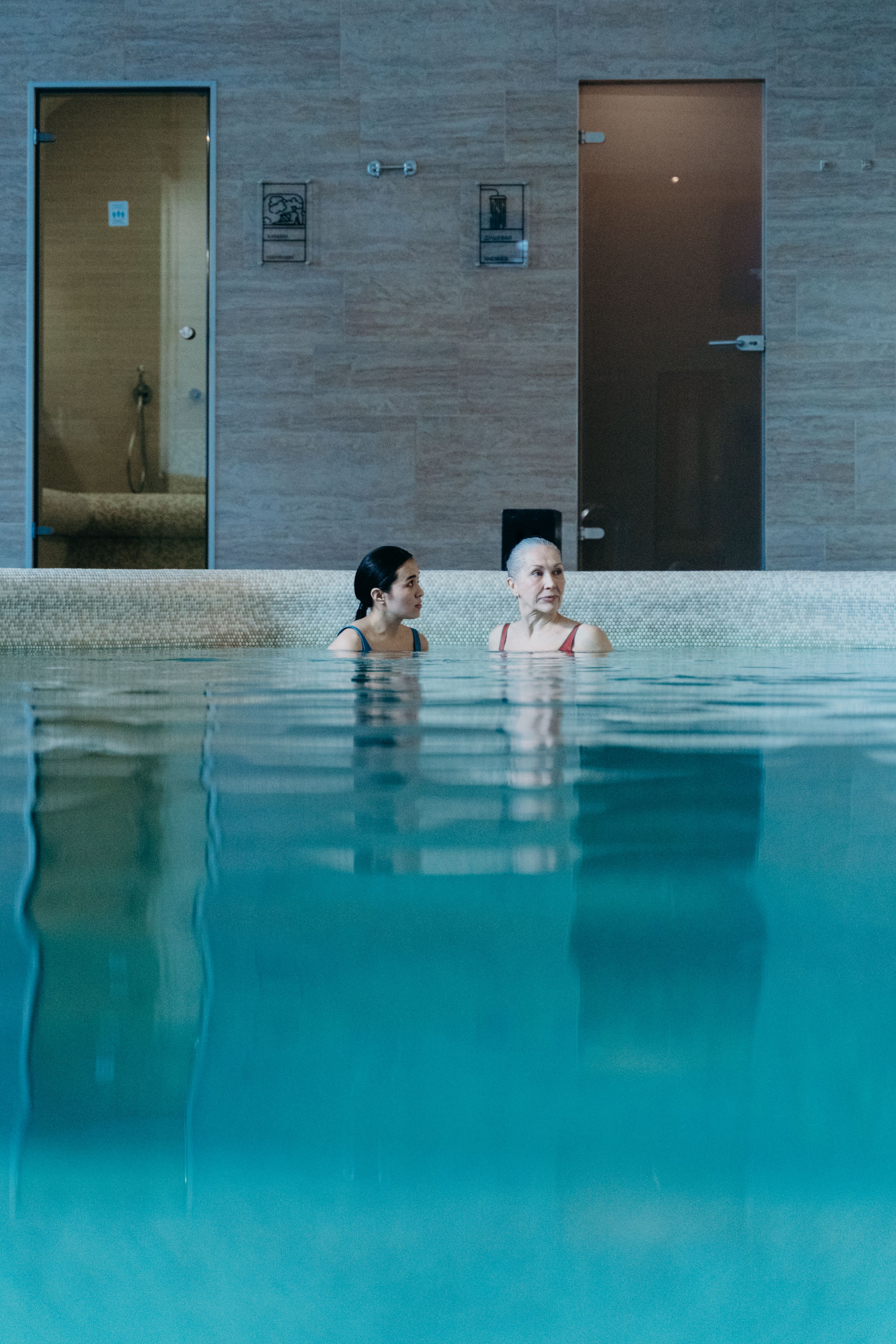 Photo of a Woman Emerging from the Water in a Swimming Pool · Free ...