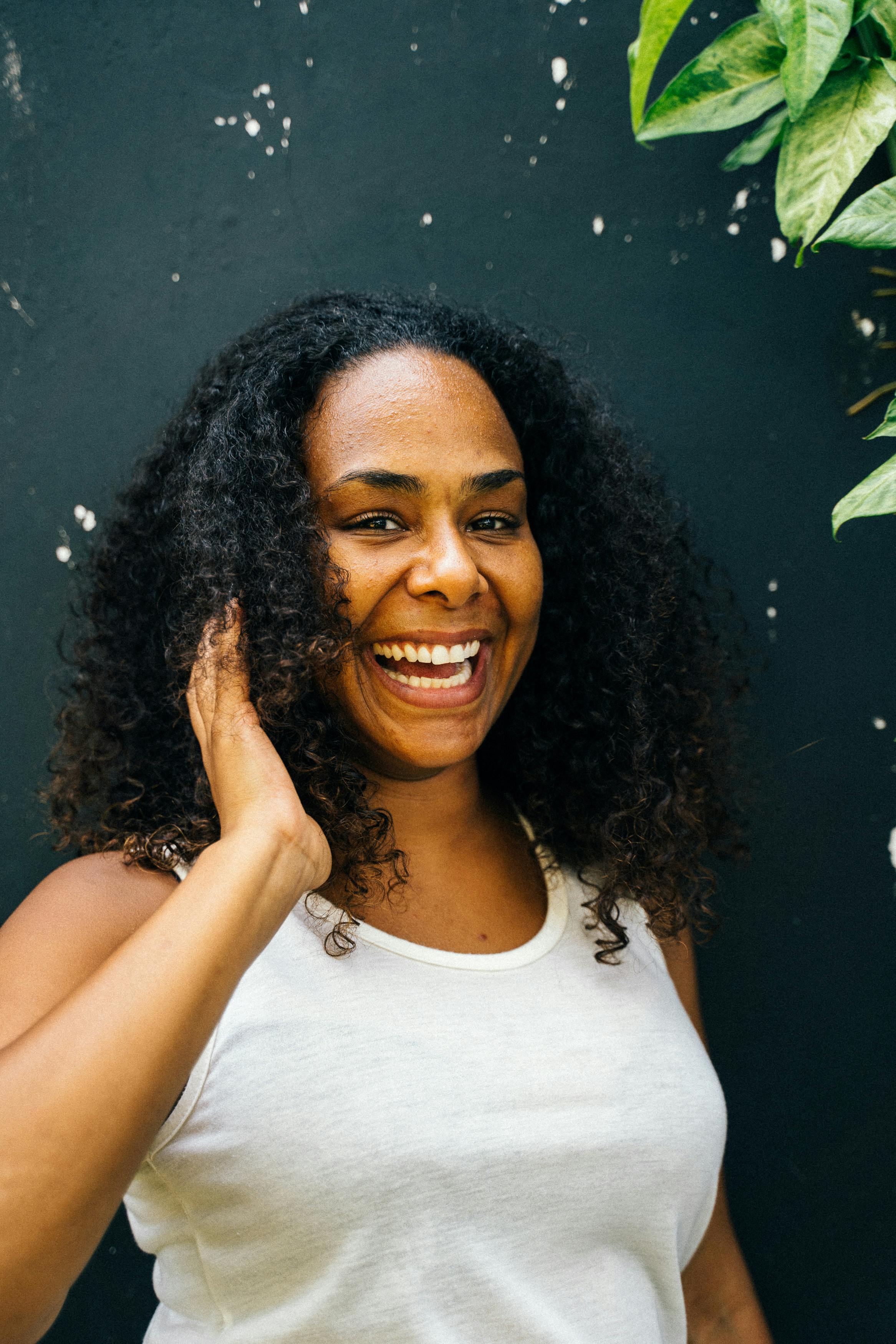 Women in White Tank Top Hugging Each Other · Free Stock Photo