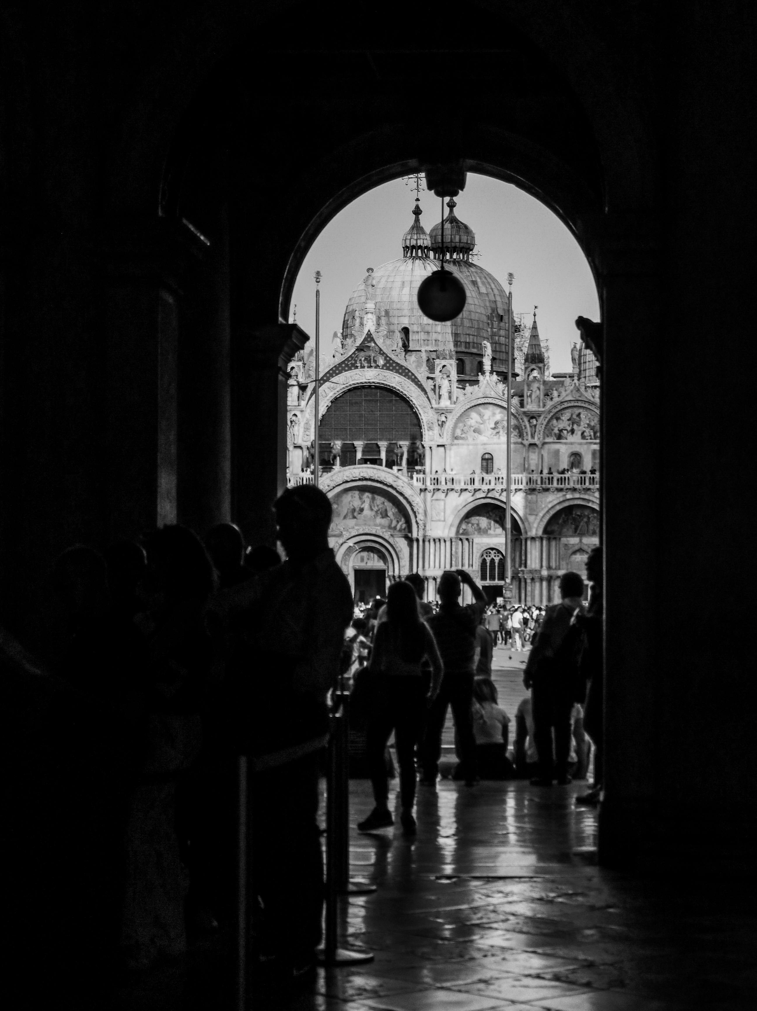 Old stone cathedrals near buildings and sculptures in Rome · Free Stock ...