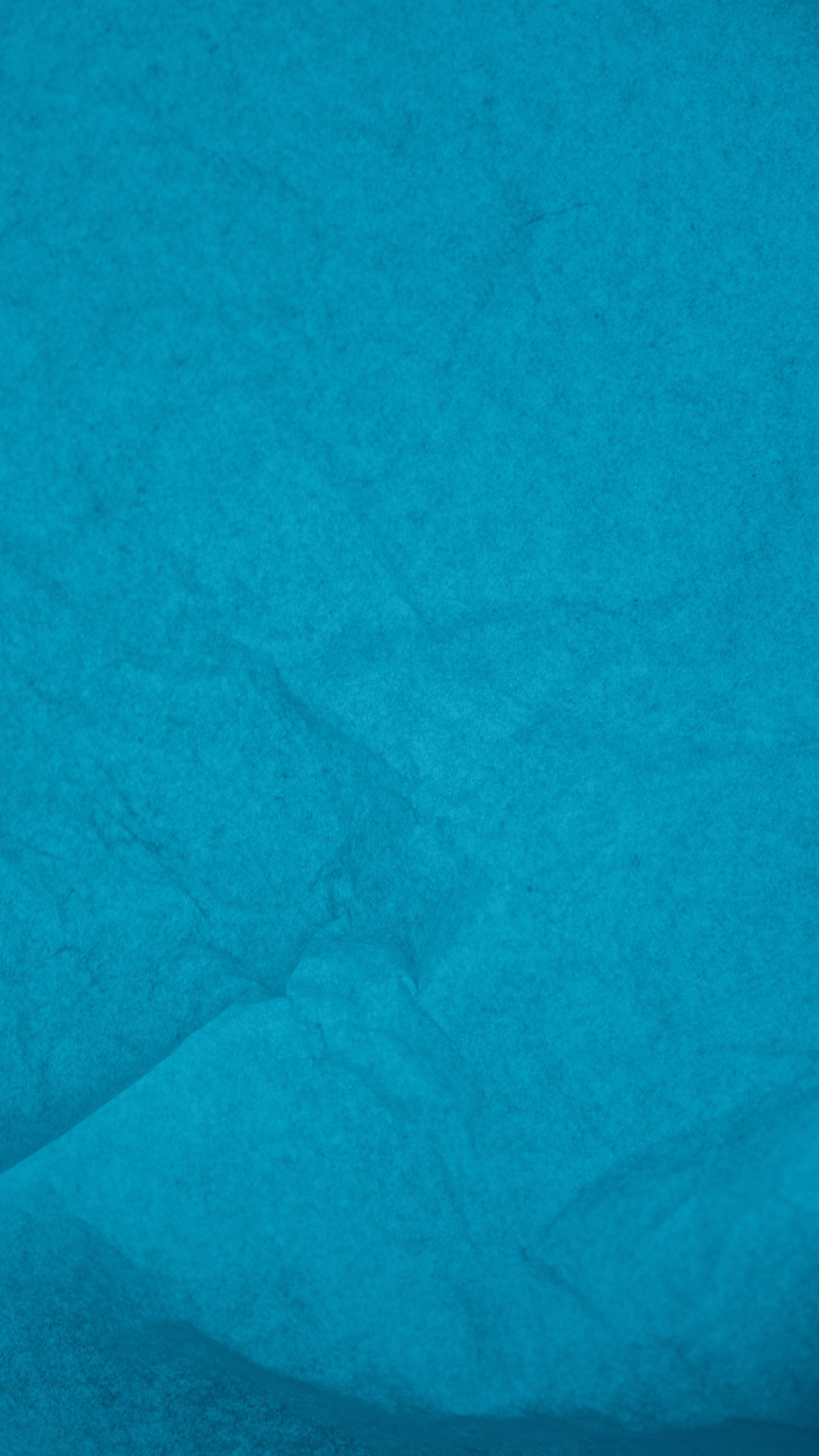 A Blue Wrinkled Paper · Free Stock Photo