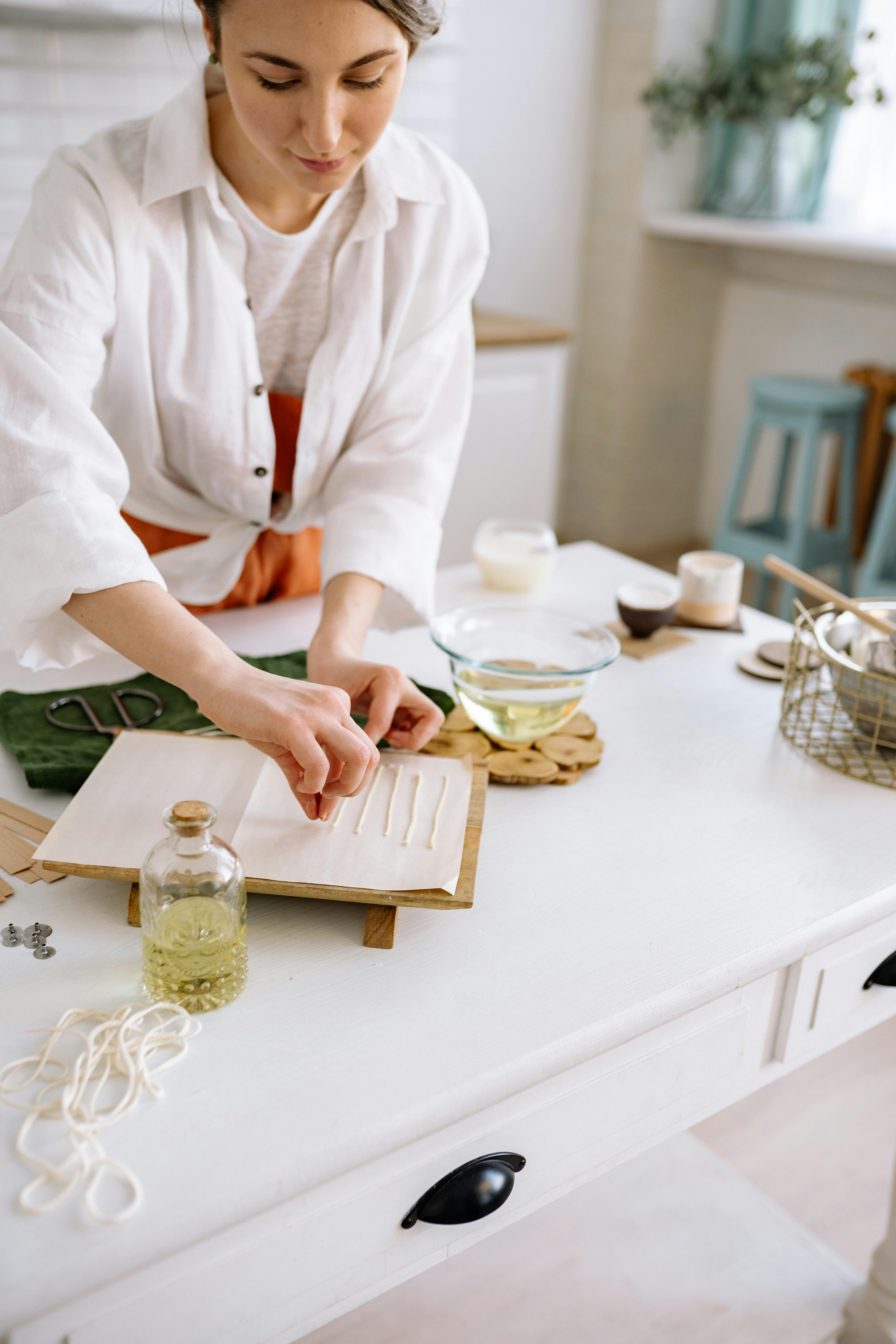 Woman Drying Wet Wicks · Free Stock Photo