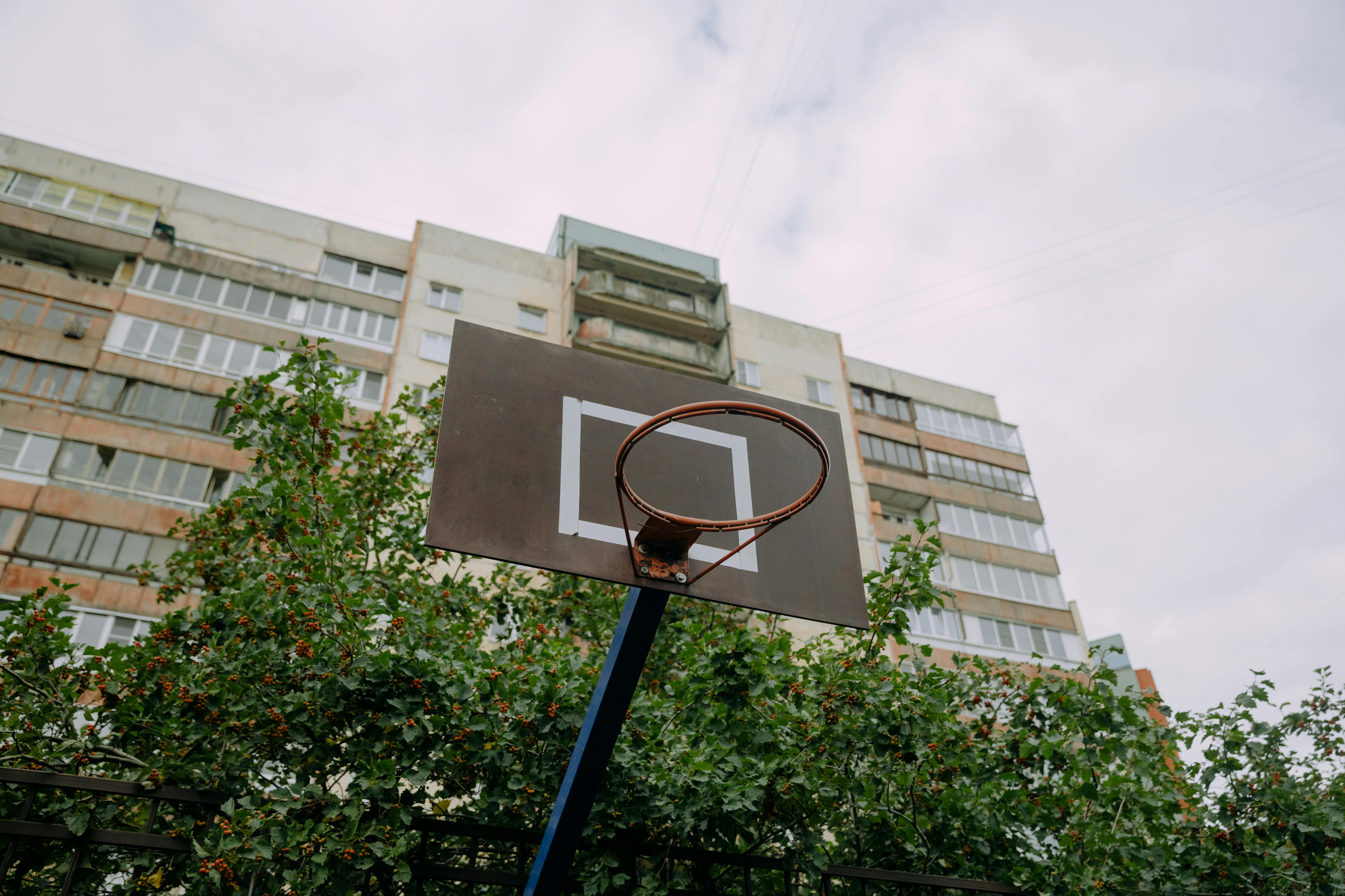 Low Angle Shot of a Basketball Ring · Free Stock Photo