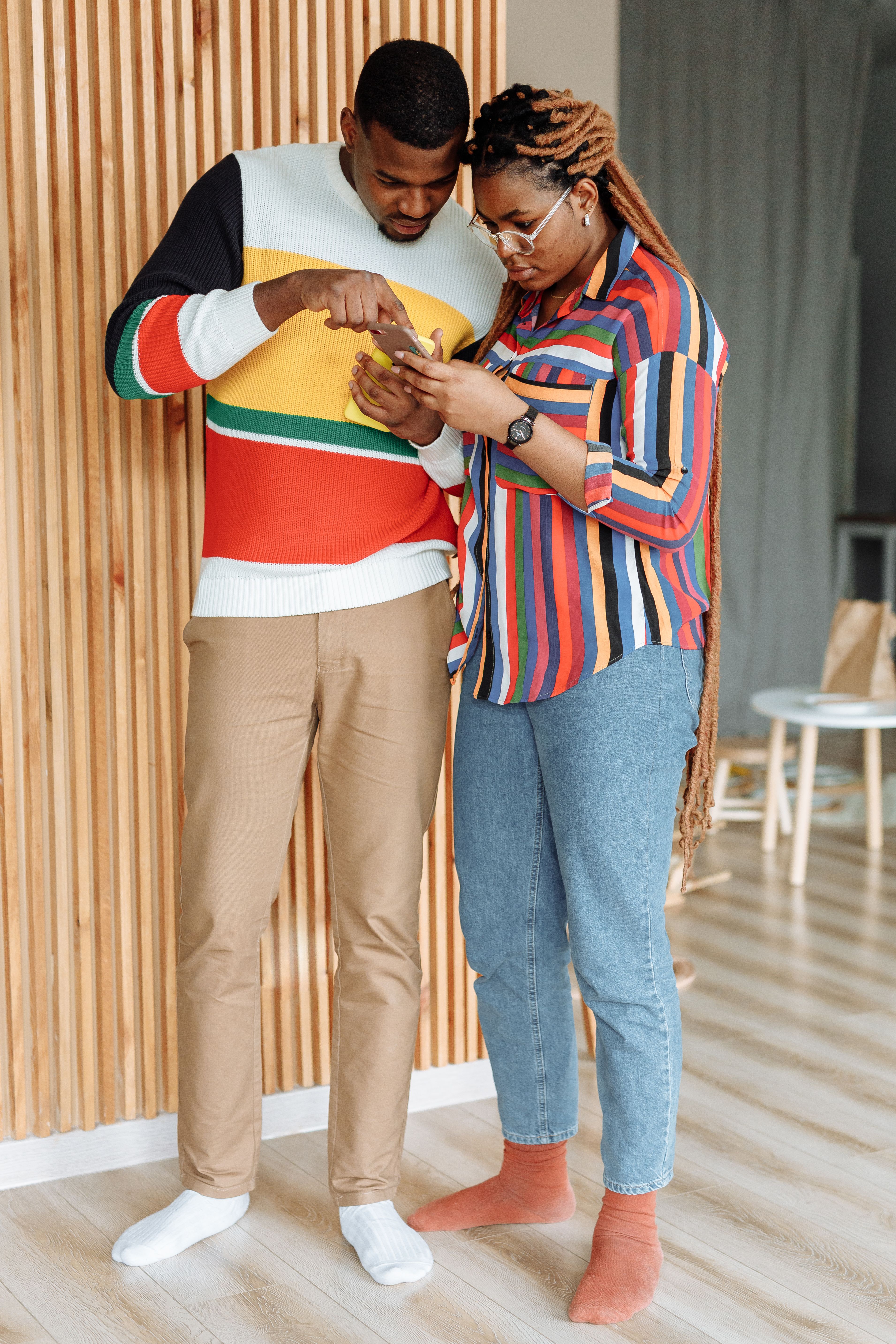 Photograph of a Man Showing Something to a Woman · Free Stock Photo