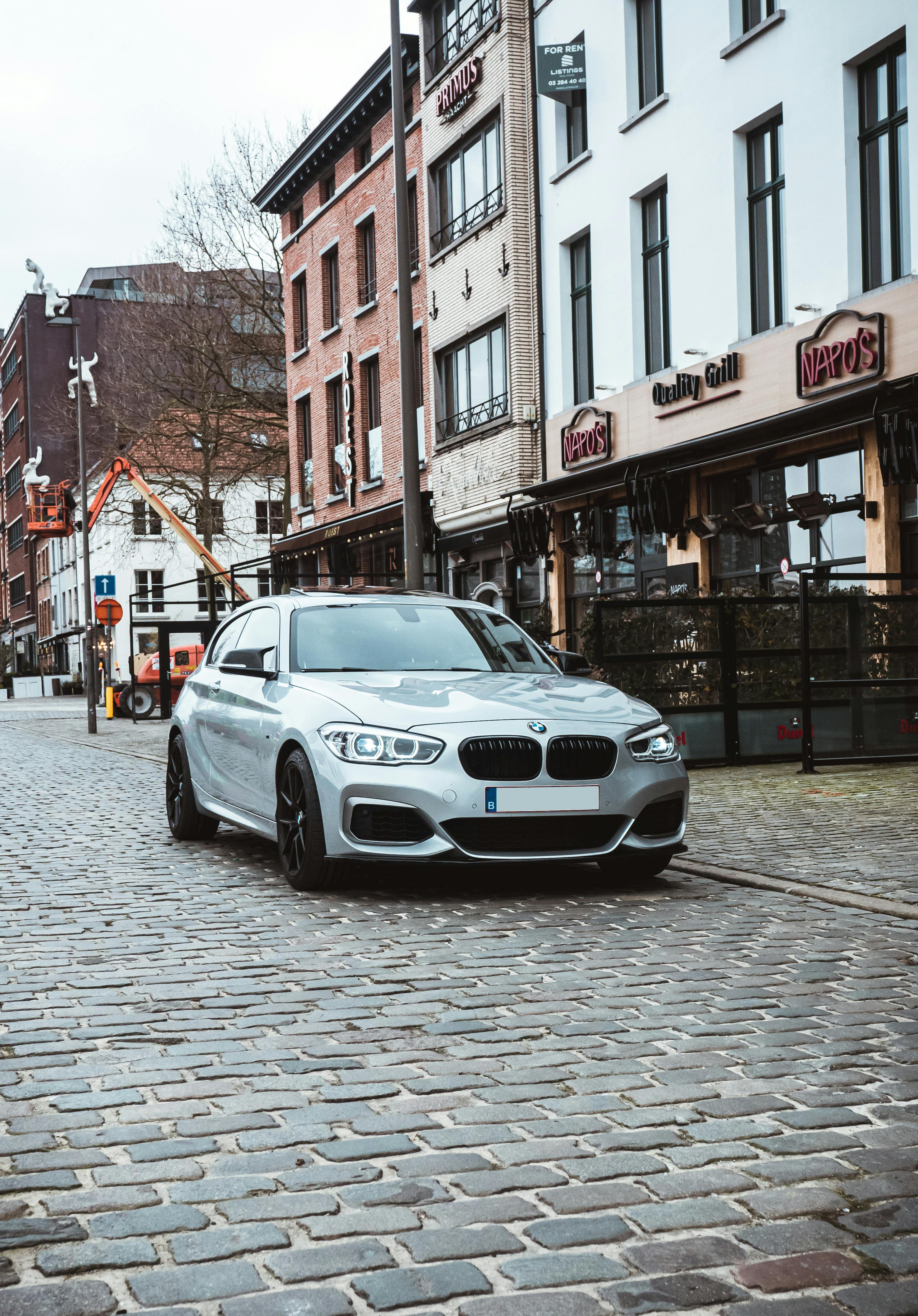 Photograph of a Silver Car on the Road · Free Stock Photo
