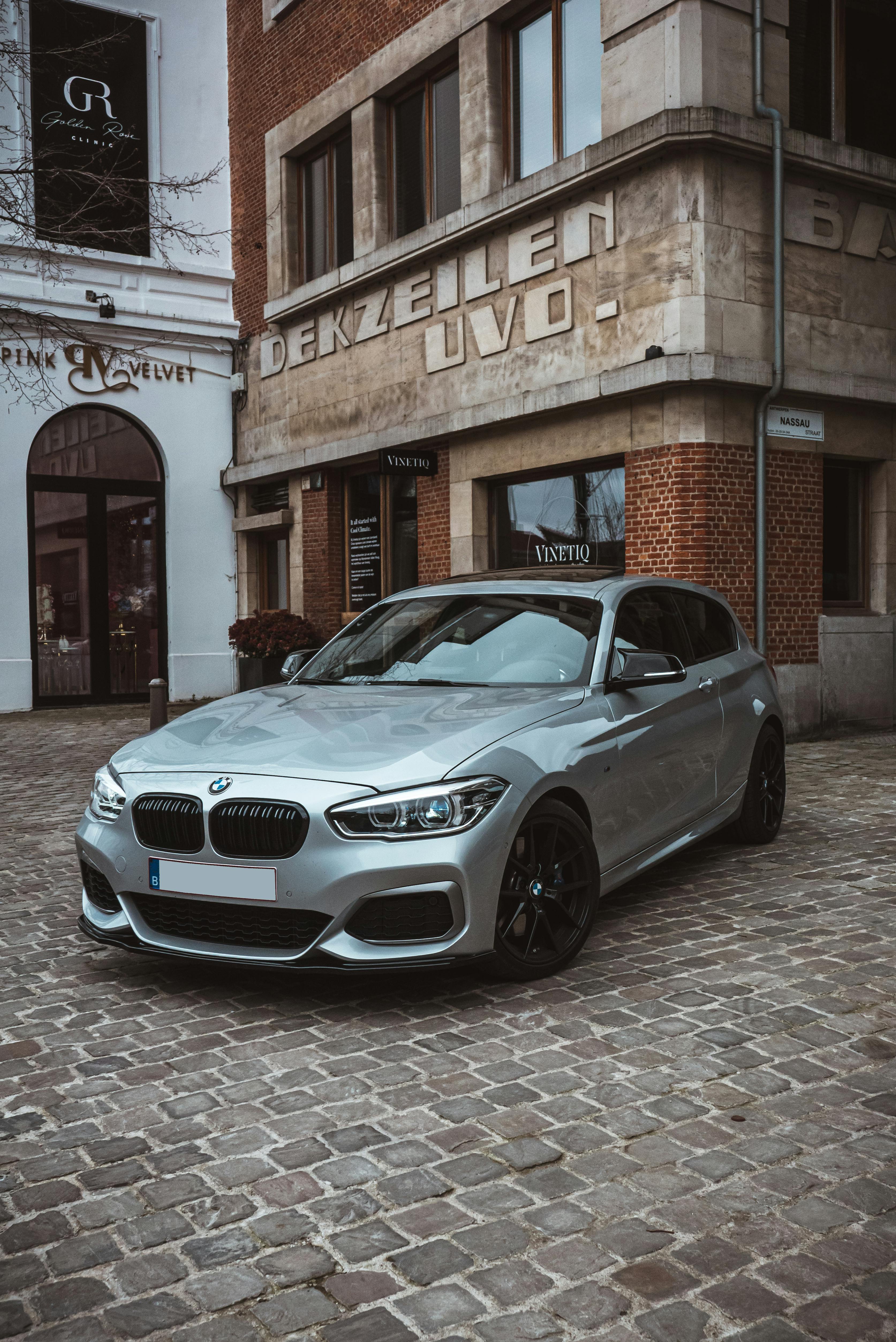 A Grayscale Photo of Bmw Car · Free Stock Photo