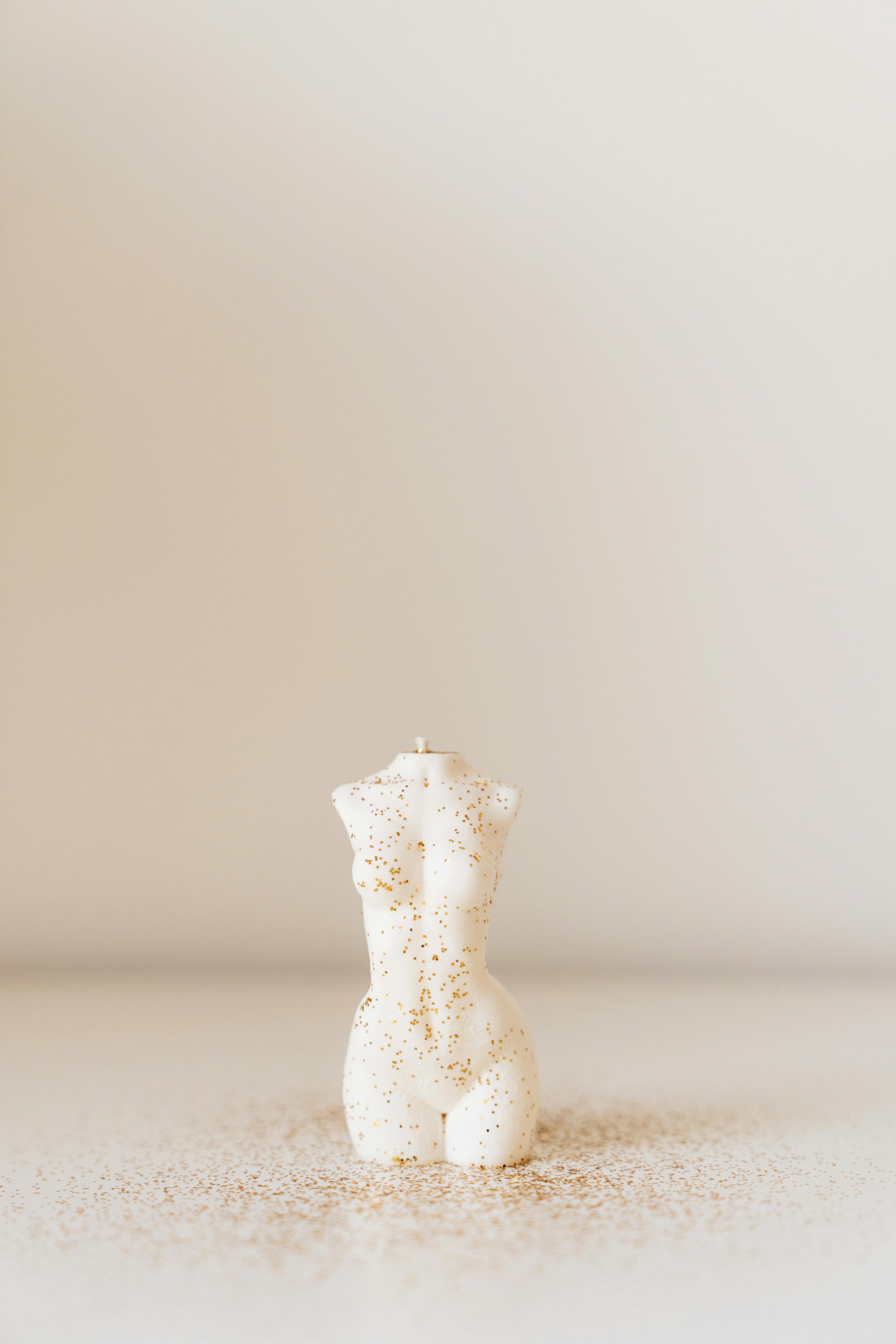 A Candle Designed as a Woman Body · Free Stock Photo