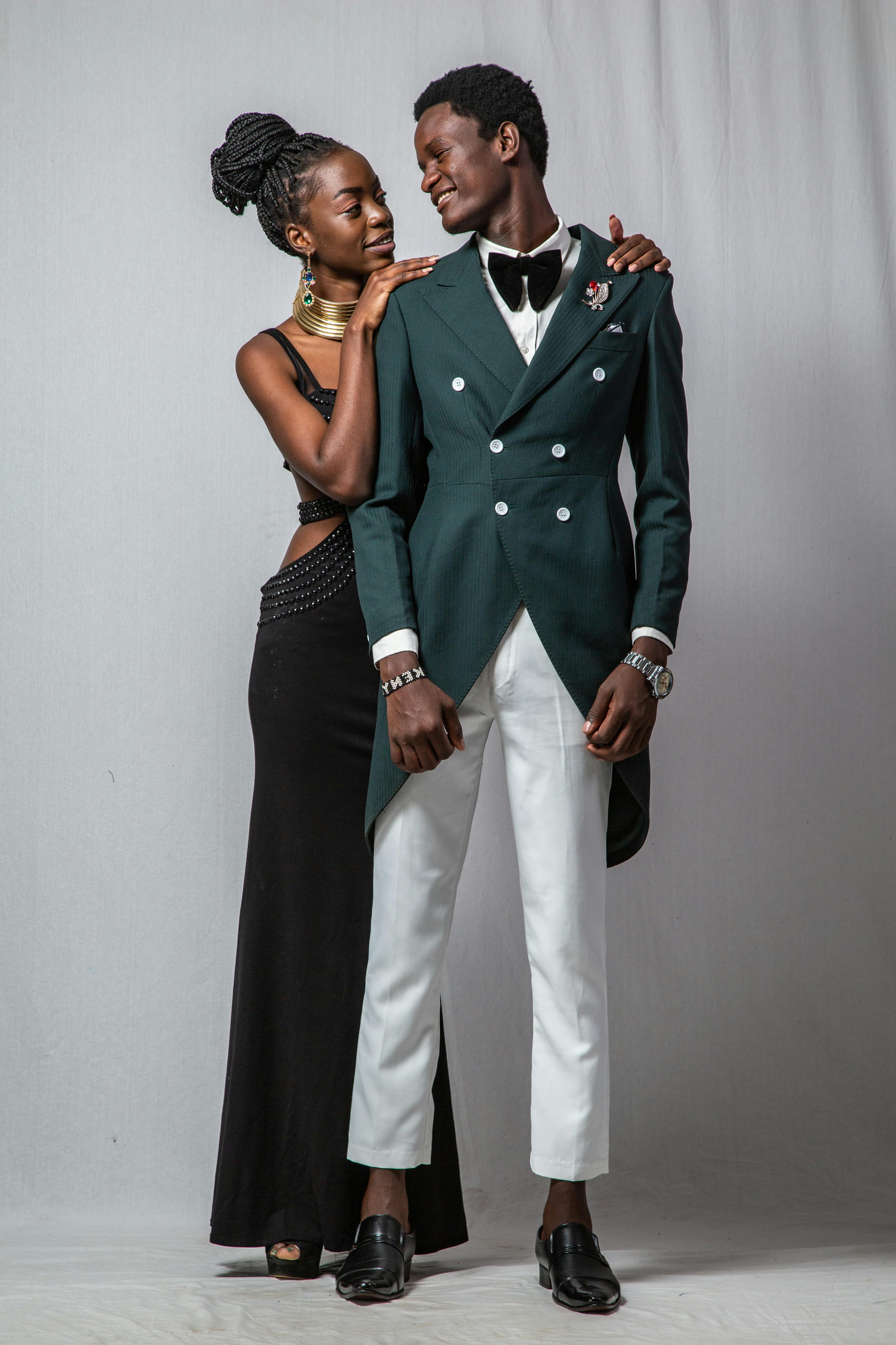 A Couple in Formal Wear Doing Photoshoot · Free Stock Photo