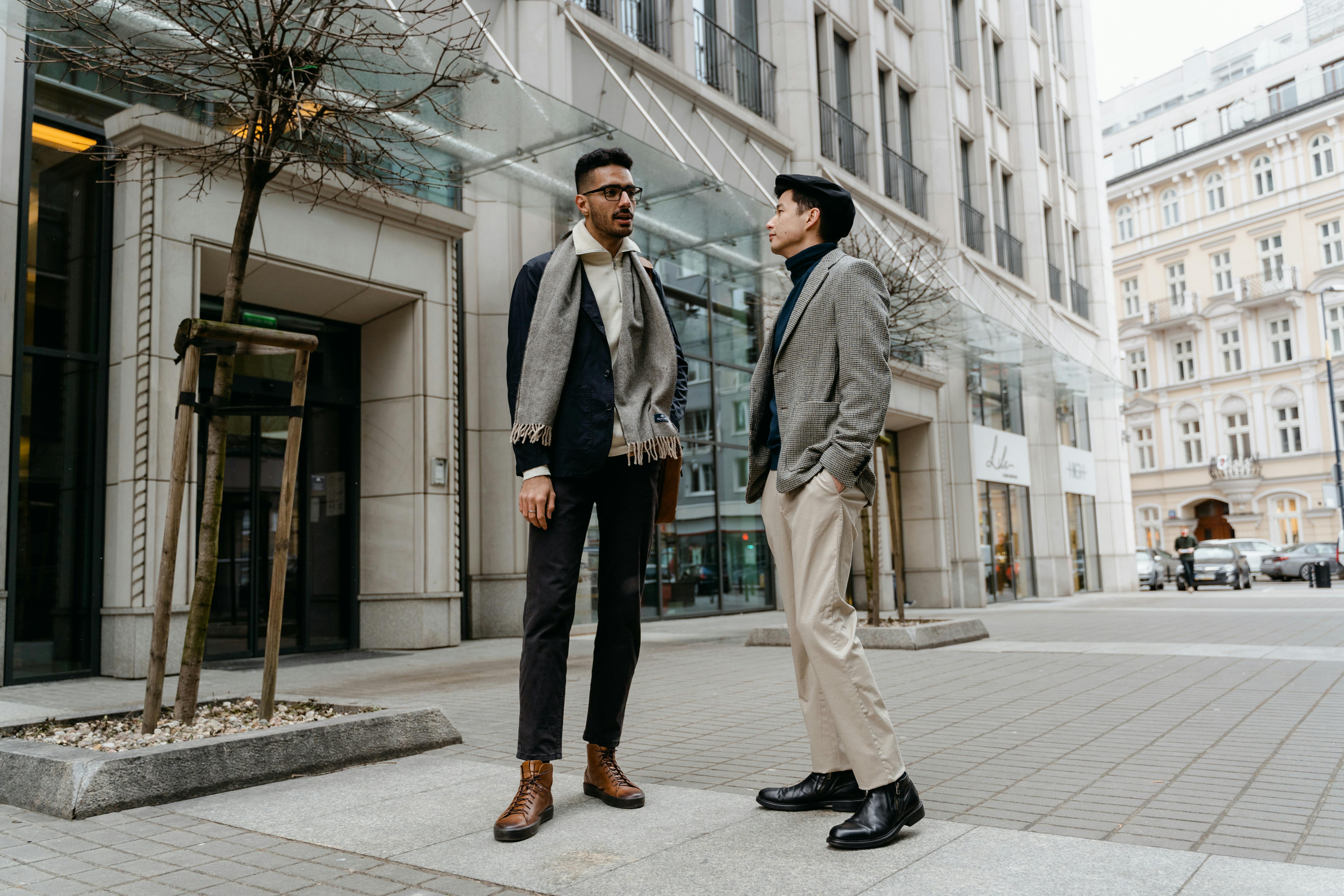 Stylish Men Having a Conversation · Free Stock Photo