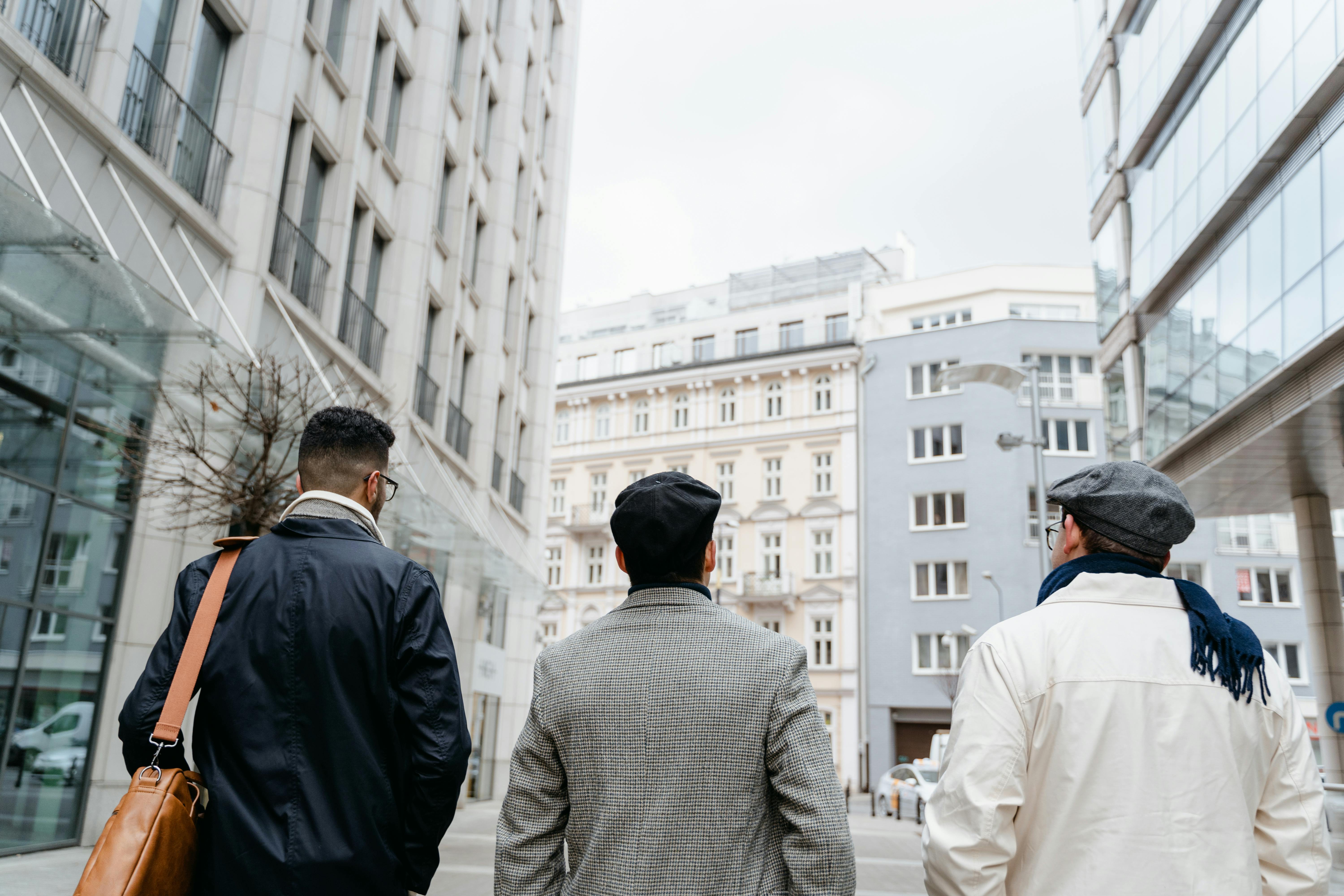 Photo of Men Walking Together · Free Stock Photo