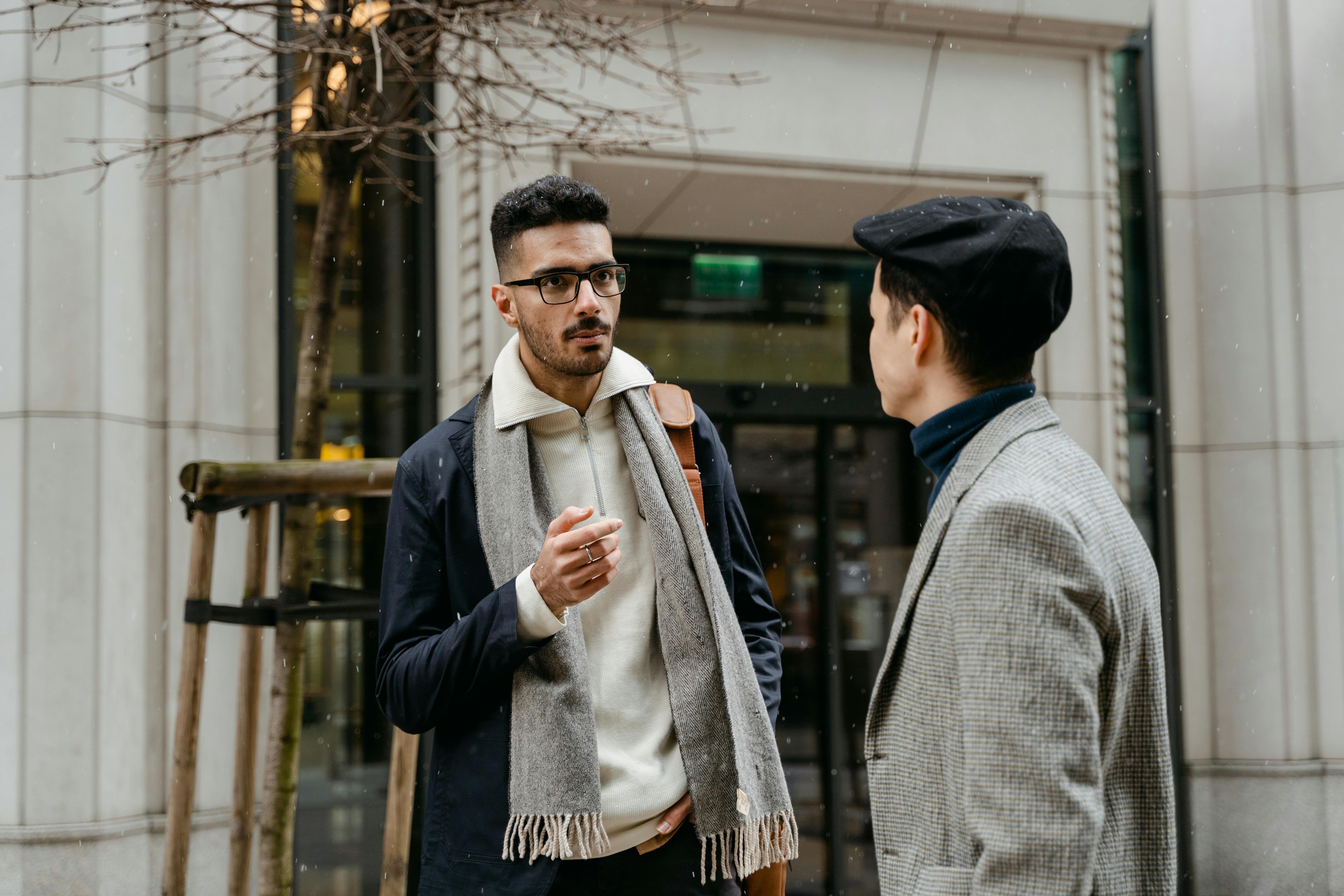 Businessmen Talking while outside a Building · Free Stock Photo