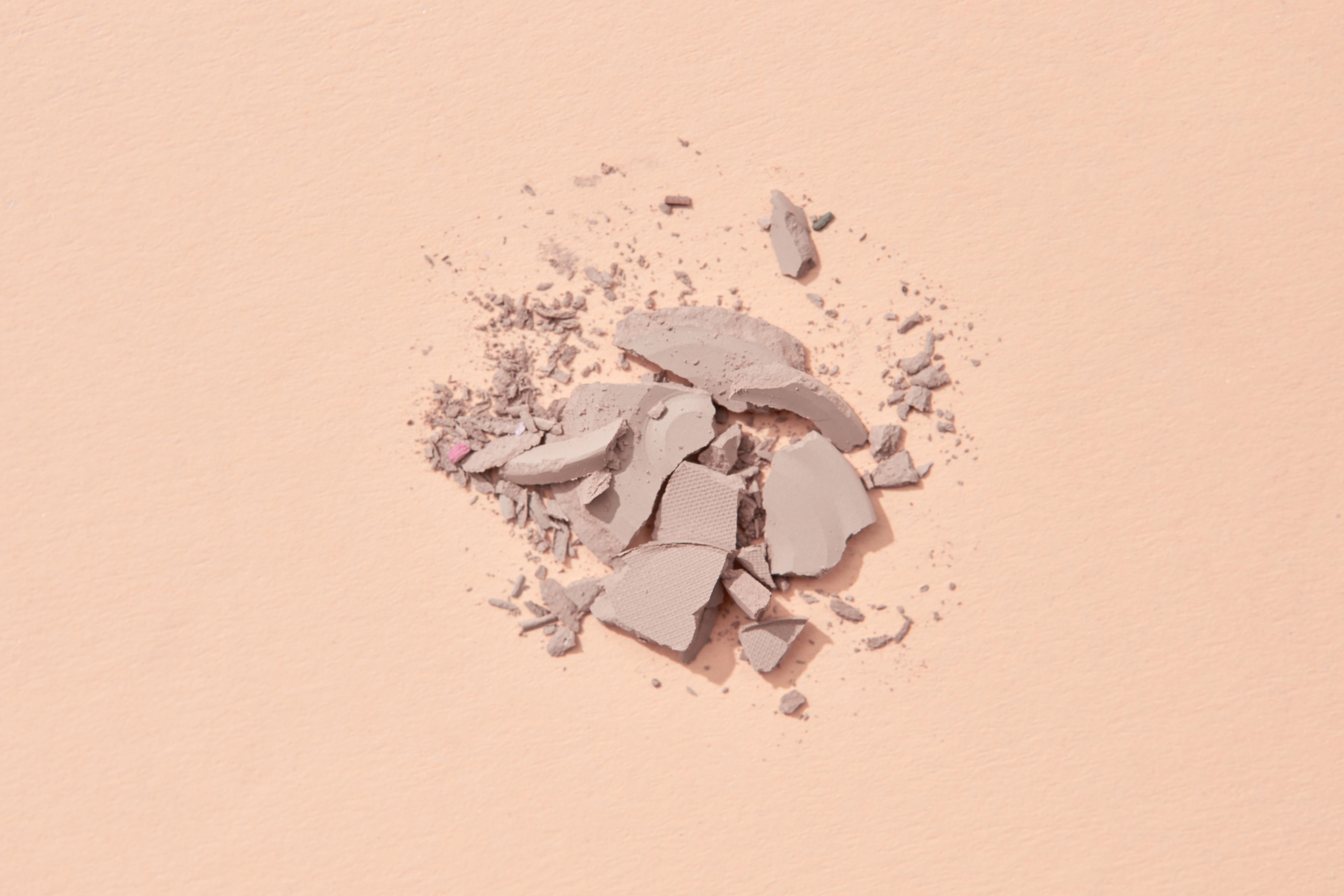 Sand Heap on Beige Background · Free Stock Photo