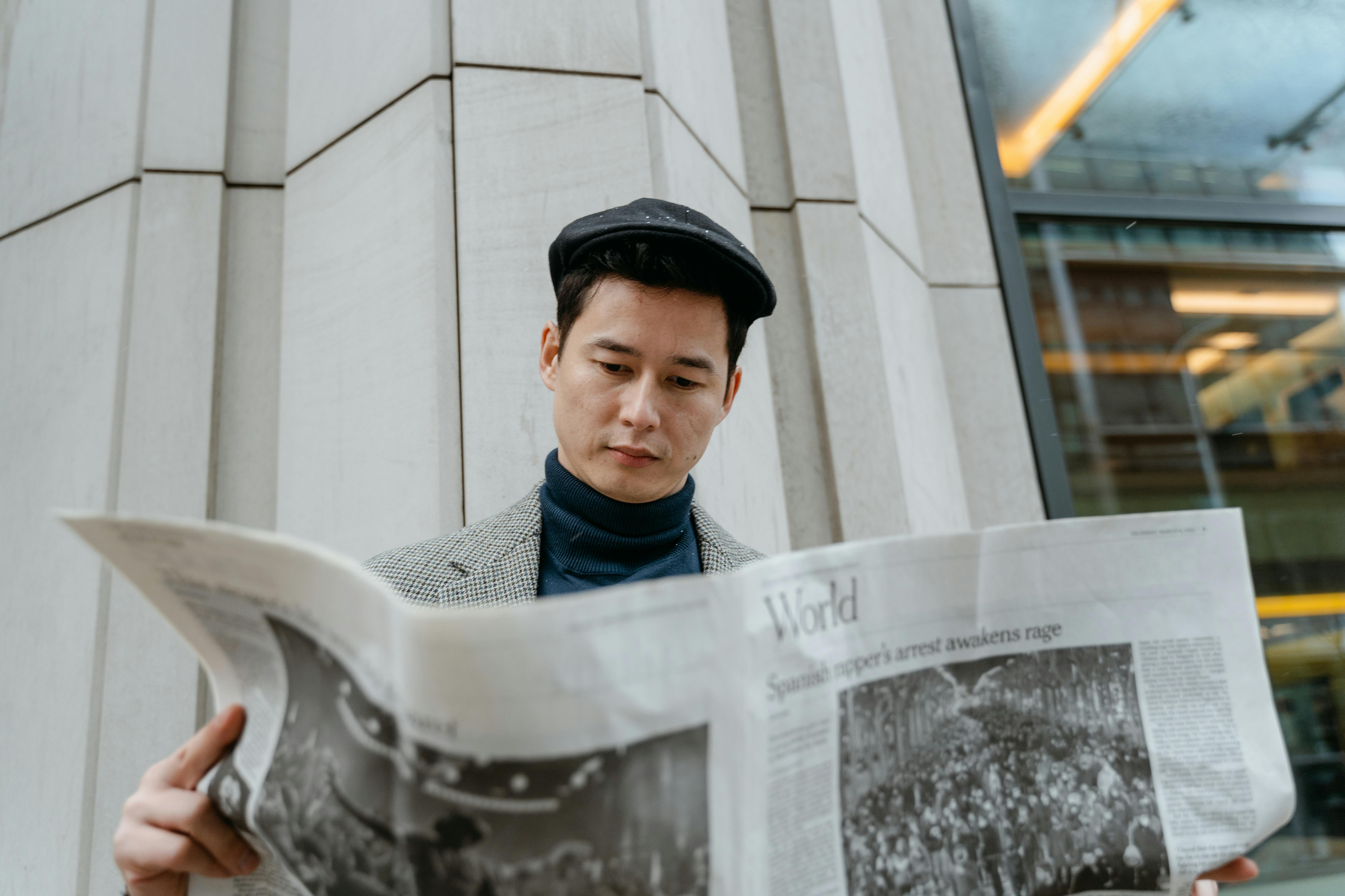 A Man Reading Newspaper · Free Stock Photo