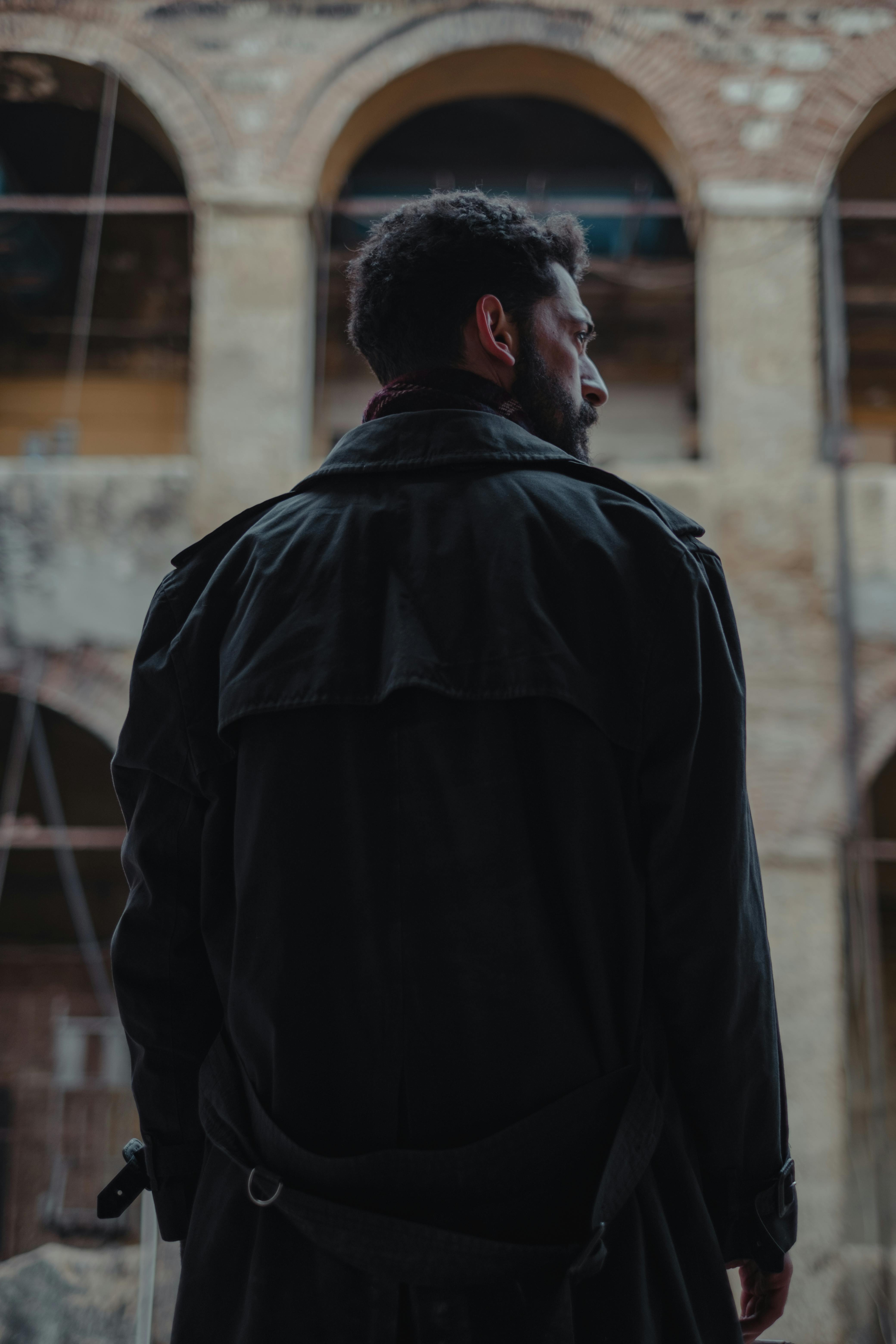 Man standing near old building · Free Stock Photo
