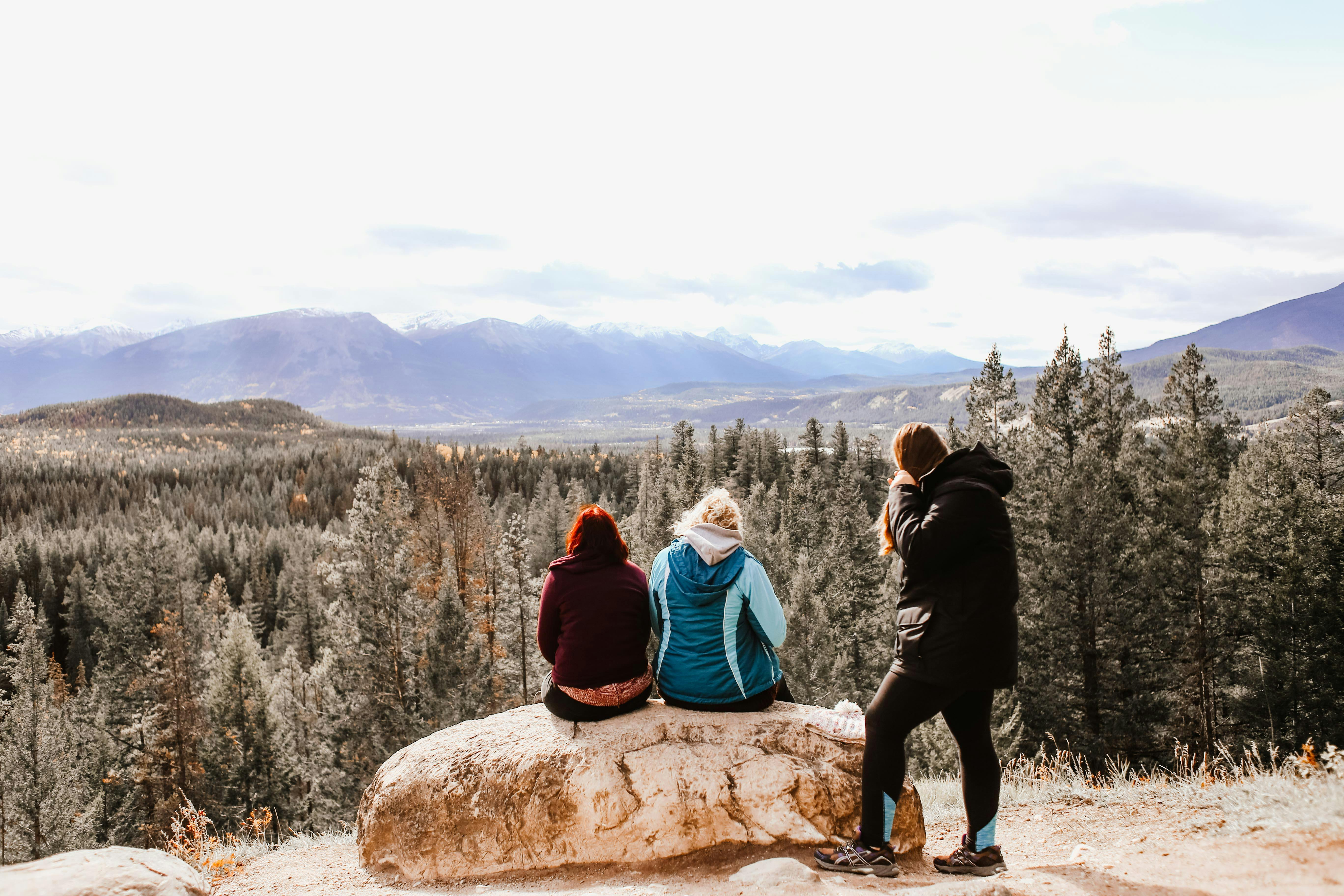 Women Looking at the Scenic View of the Mountains · Free Stock Photo