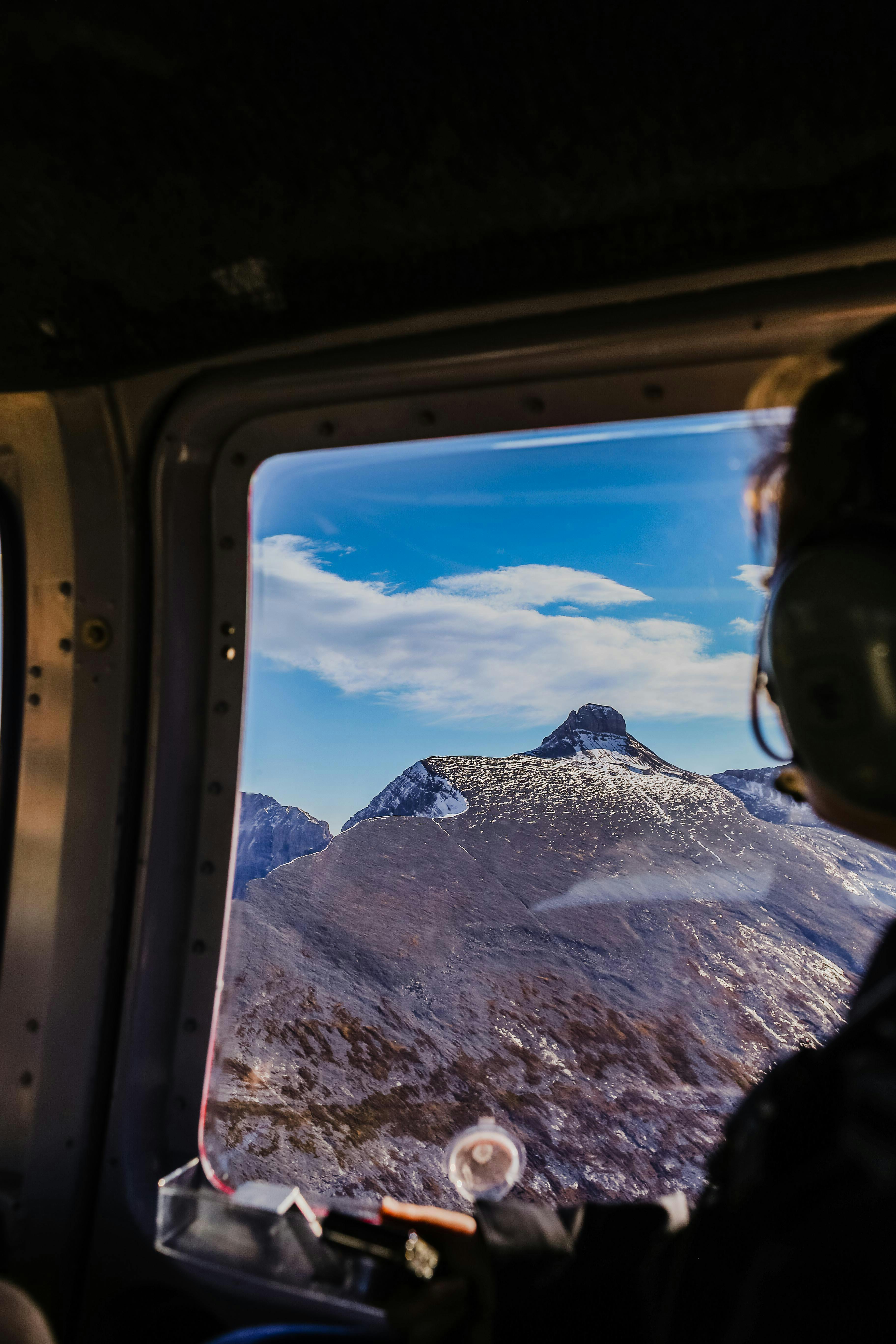 View of the Mountains From a Window · Free Stock Photo