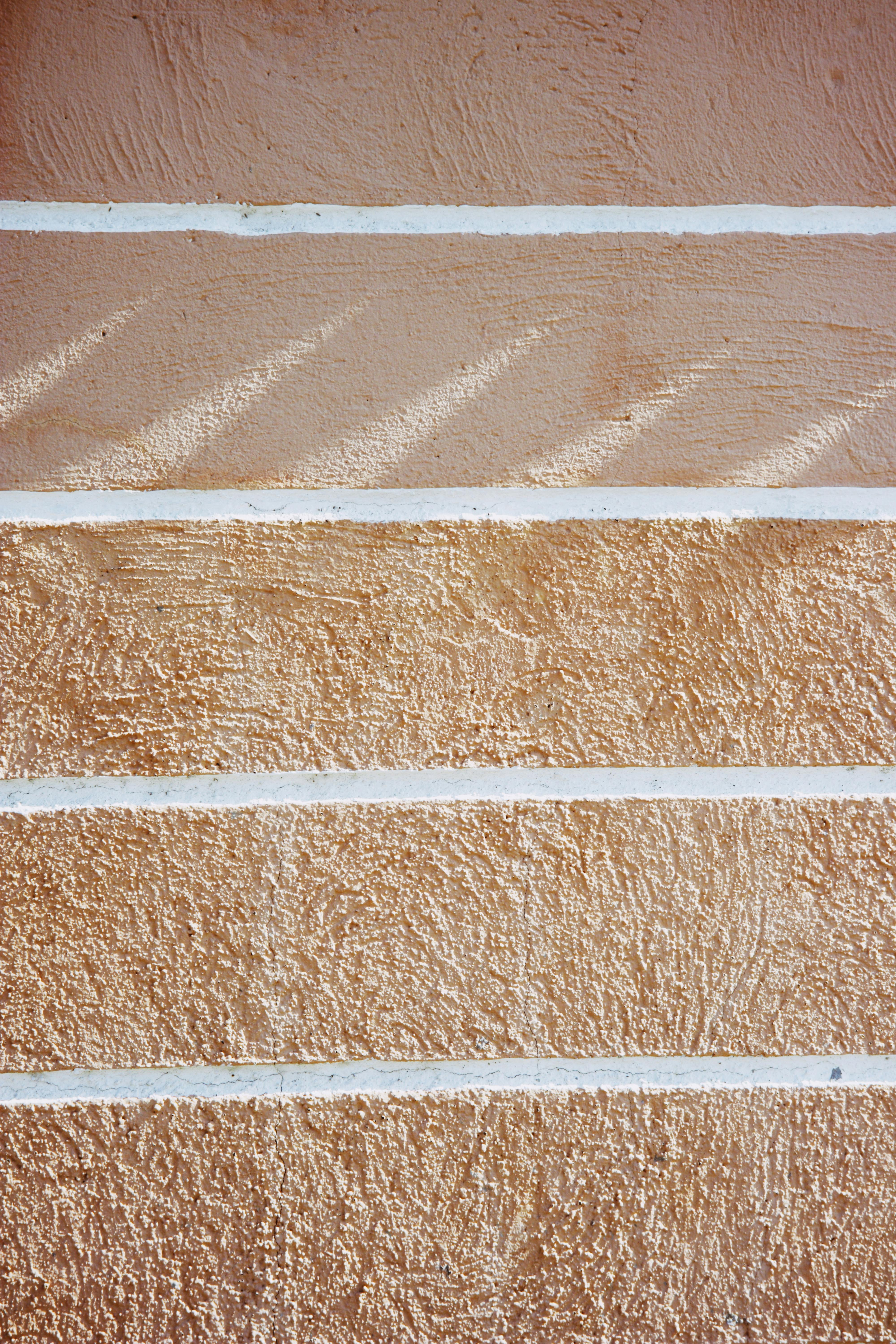 Close-Up Shot of Brown Rough Wall · Free Stock Photo