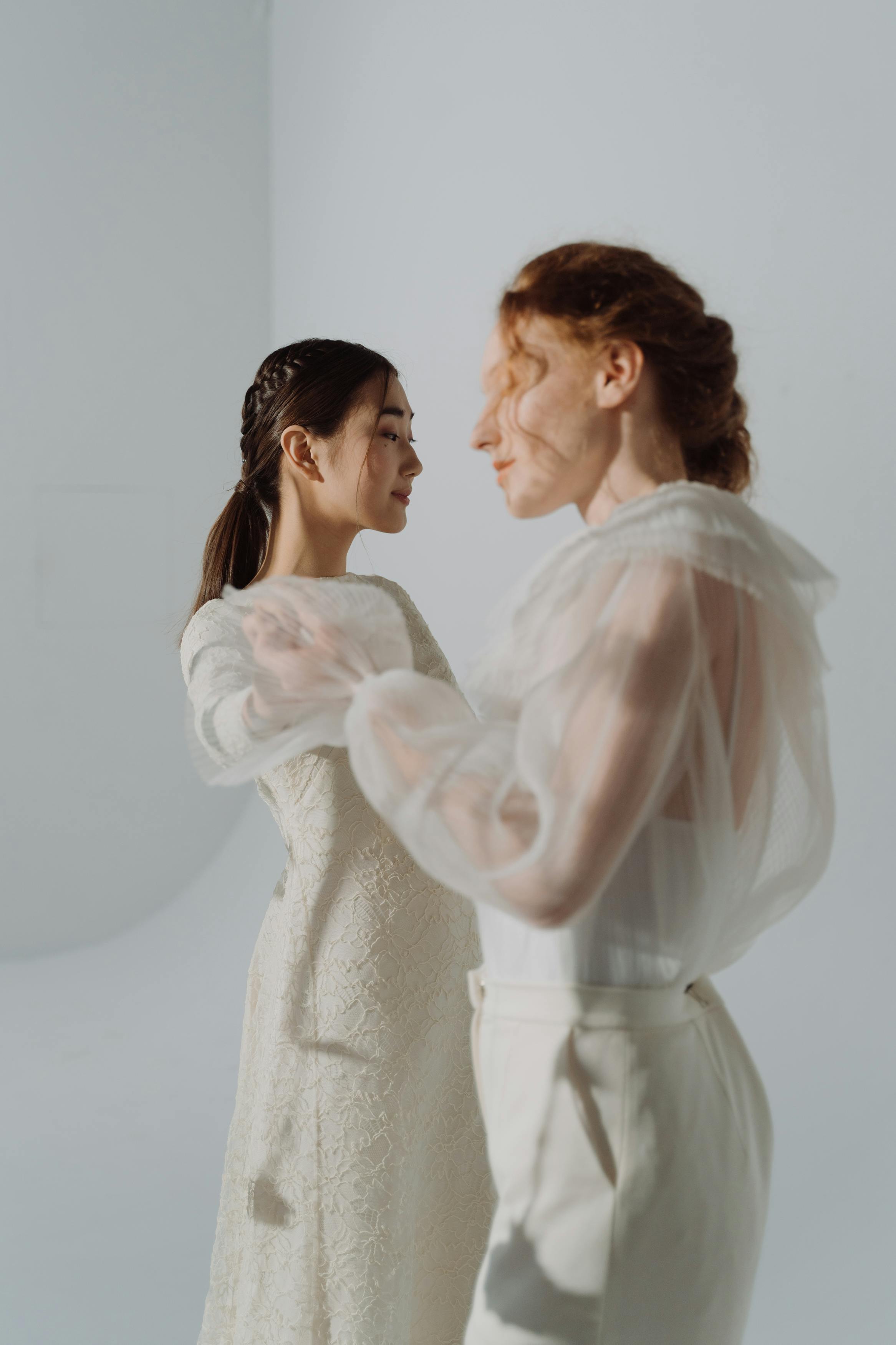 Women in White Clothes Dancing · Free Stock Photo