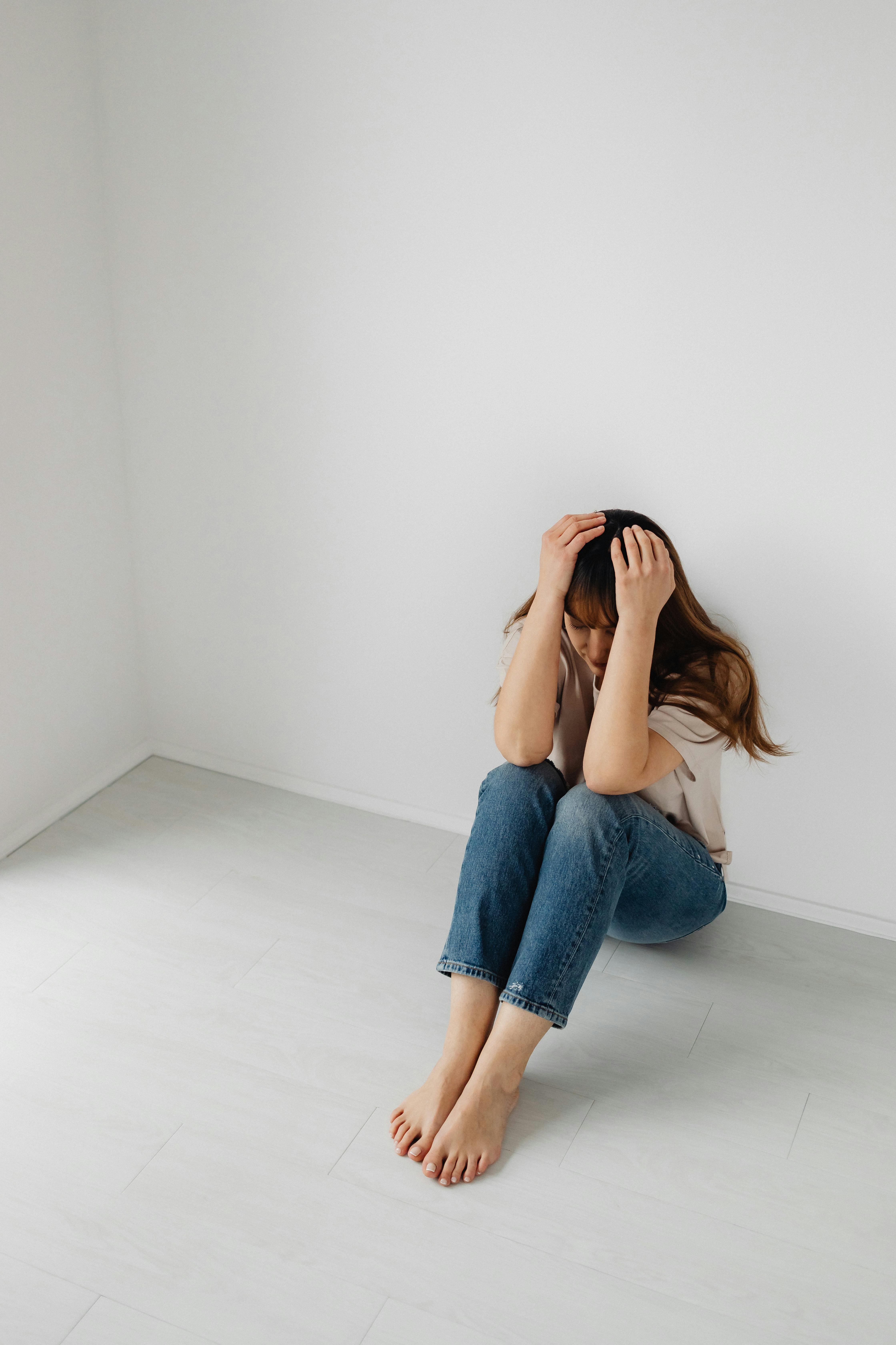 Sad Woman Sitting on Floor · Free Stock Photo
