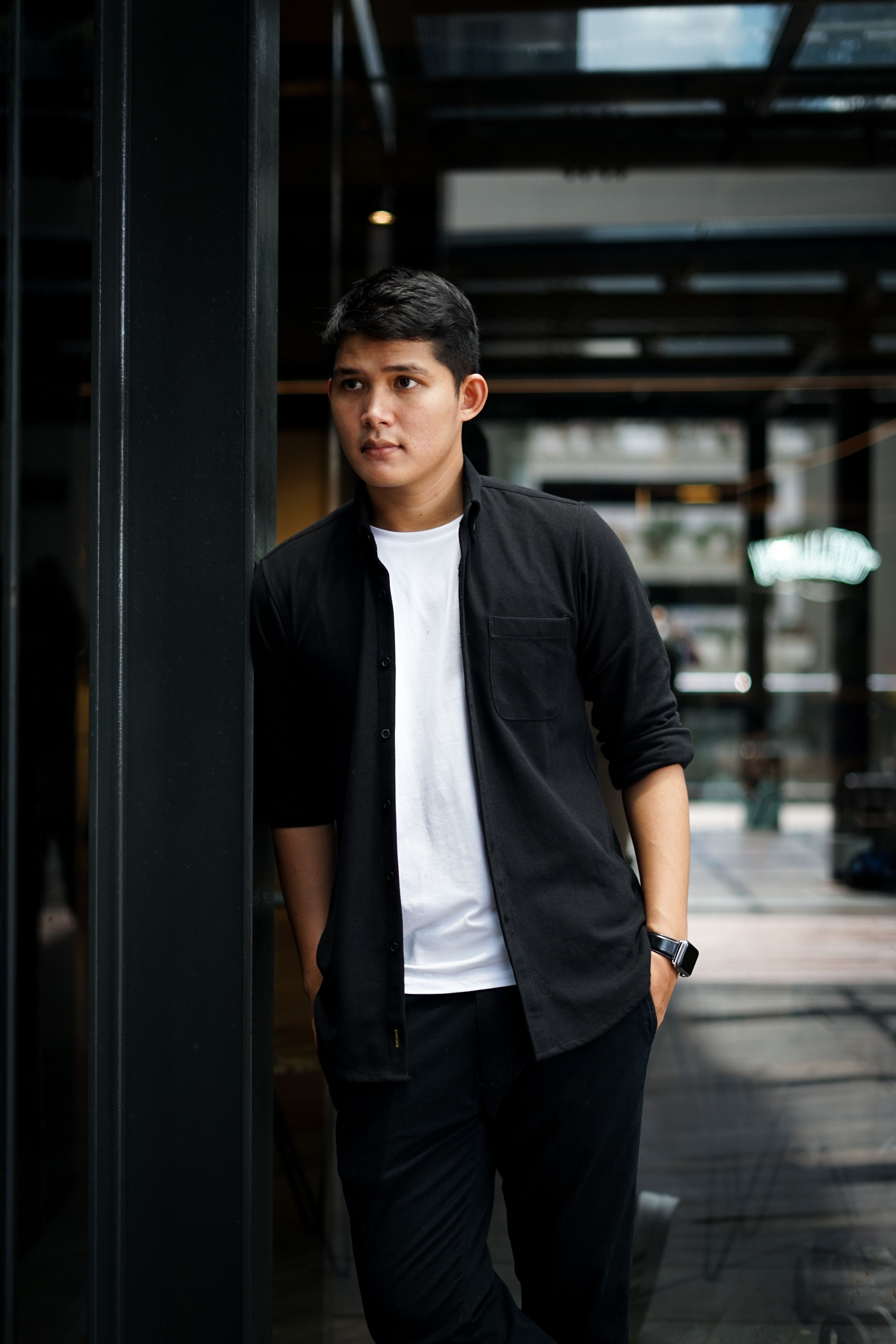 A Man Wearing a Black Button Down Shirt · Free Stock Photo