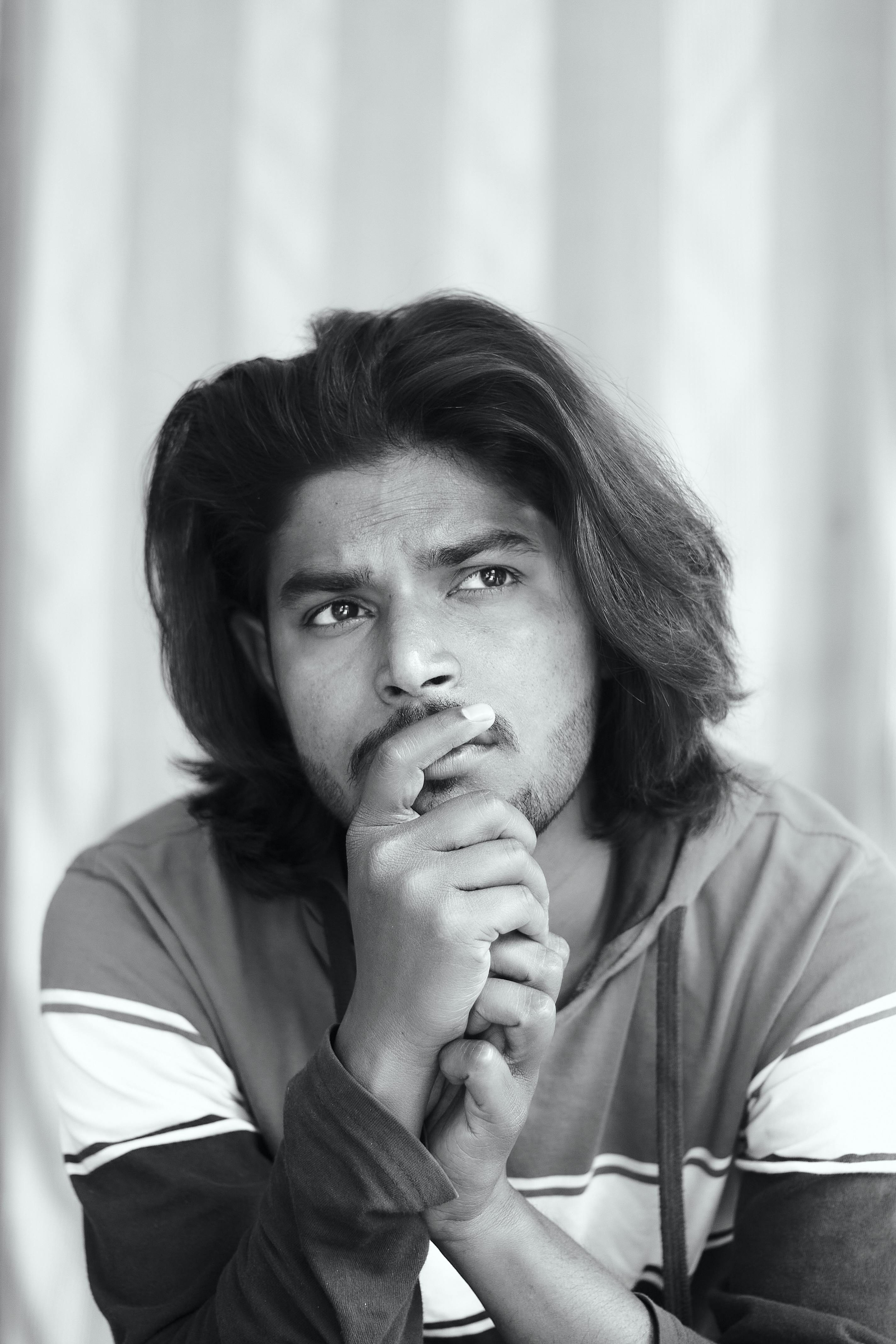 Grayscale Photo of Man Touching his Neck · Free Stock Photo