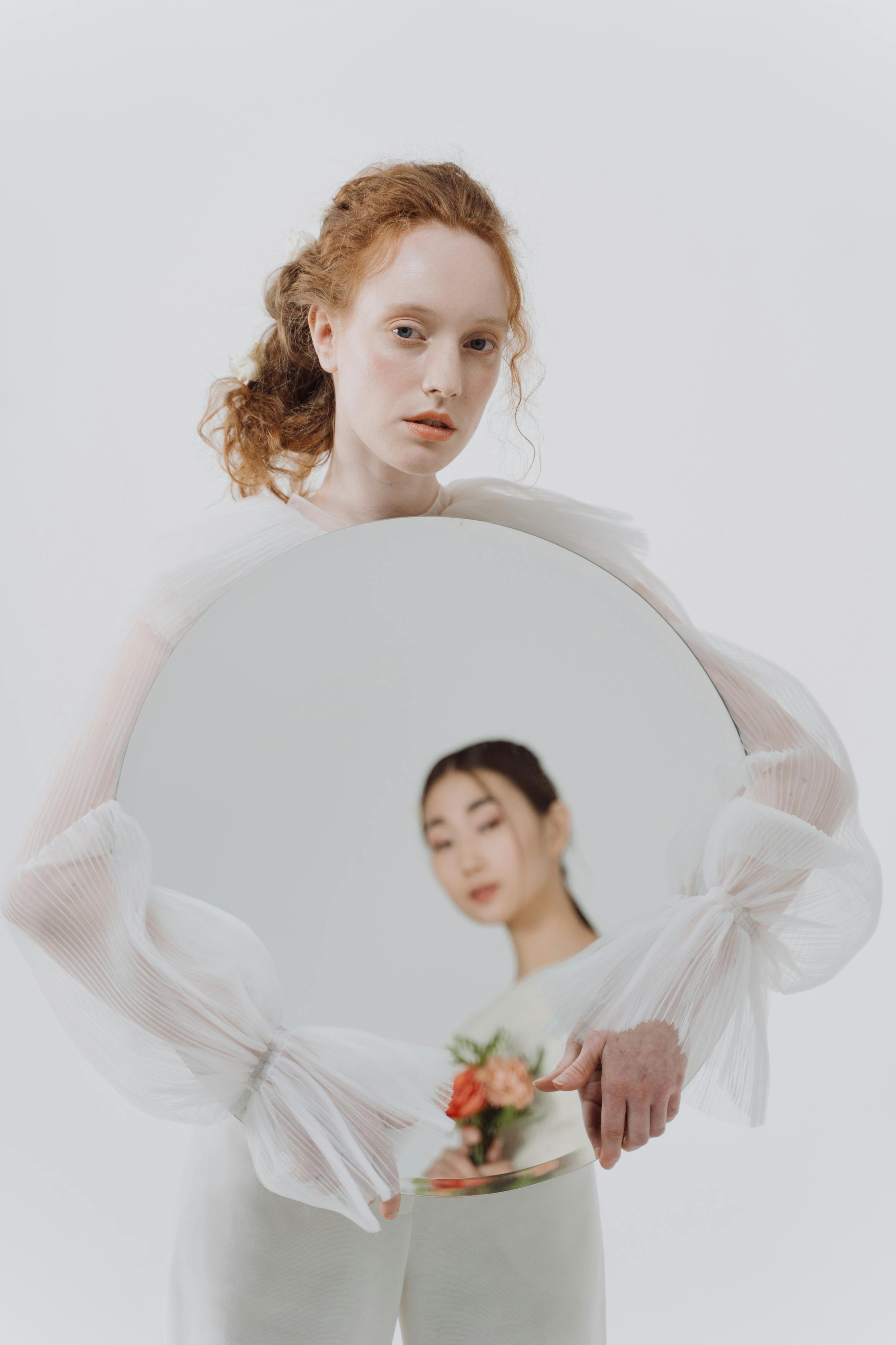 A Person Holding a Mirror · Free Stock Photo