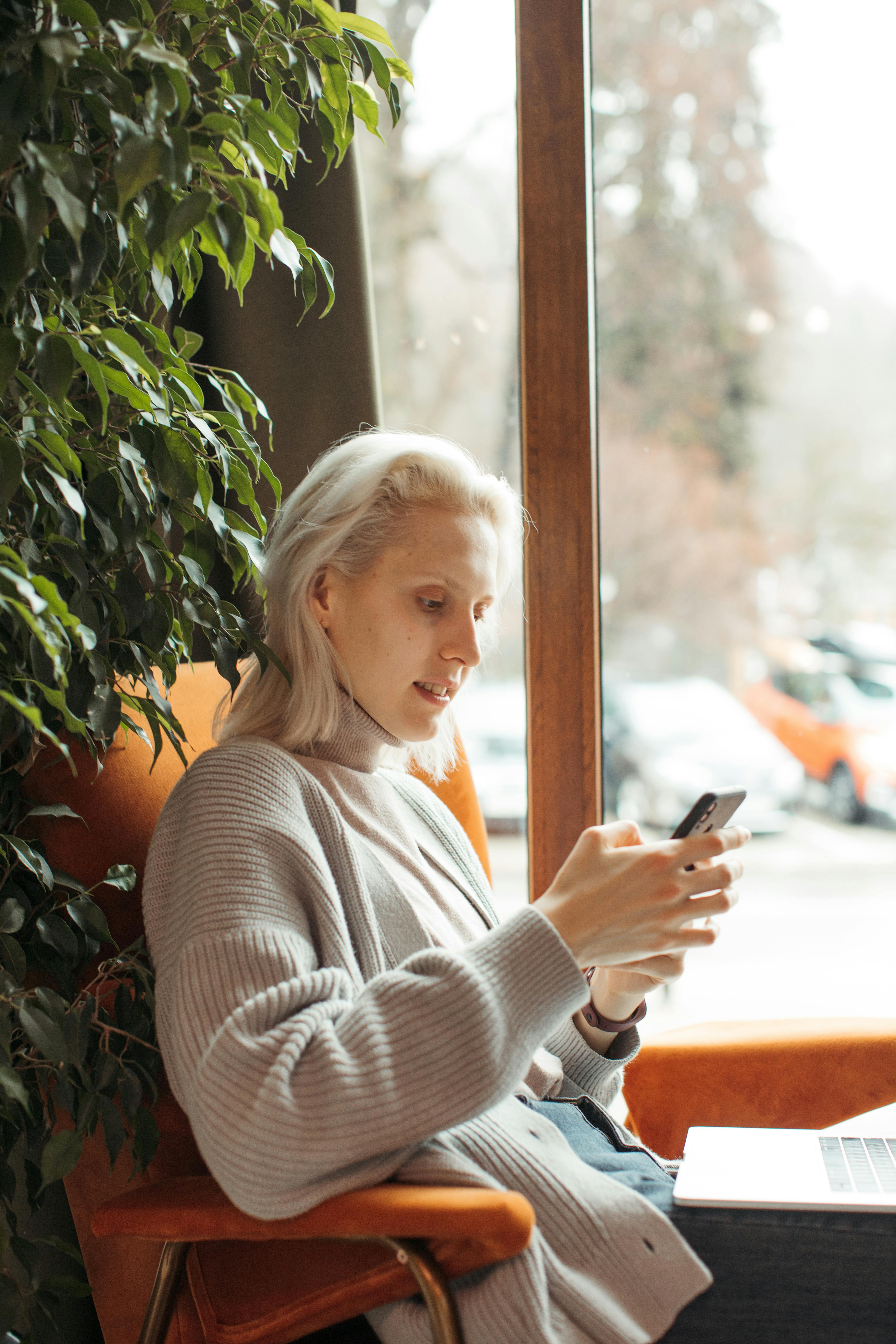 Woman Using Smartphone · Free Stock Photo