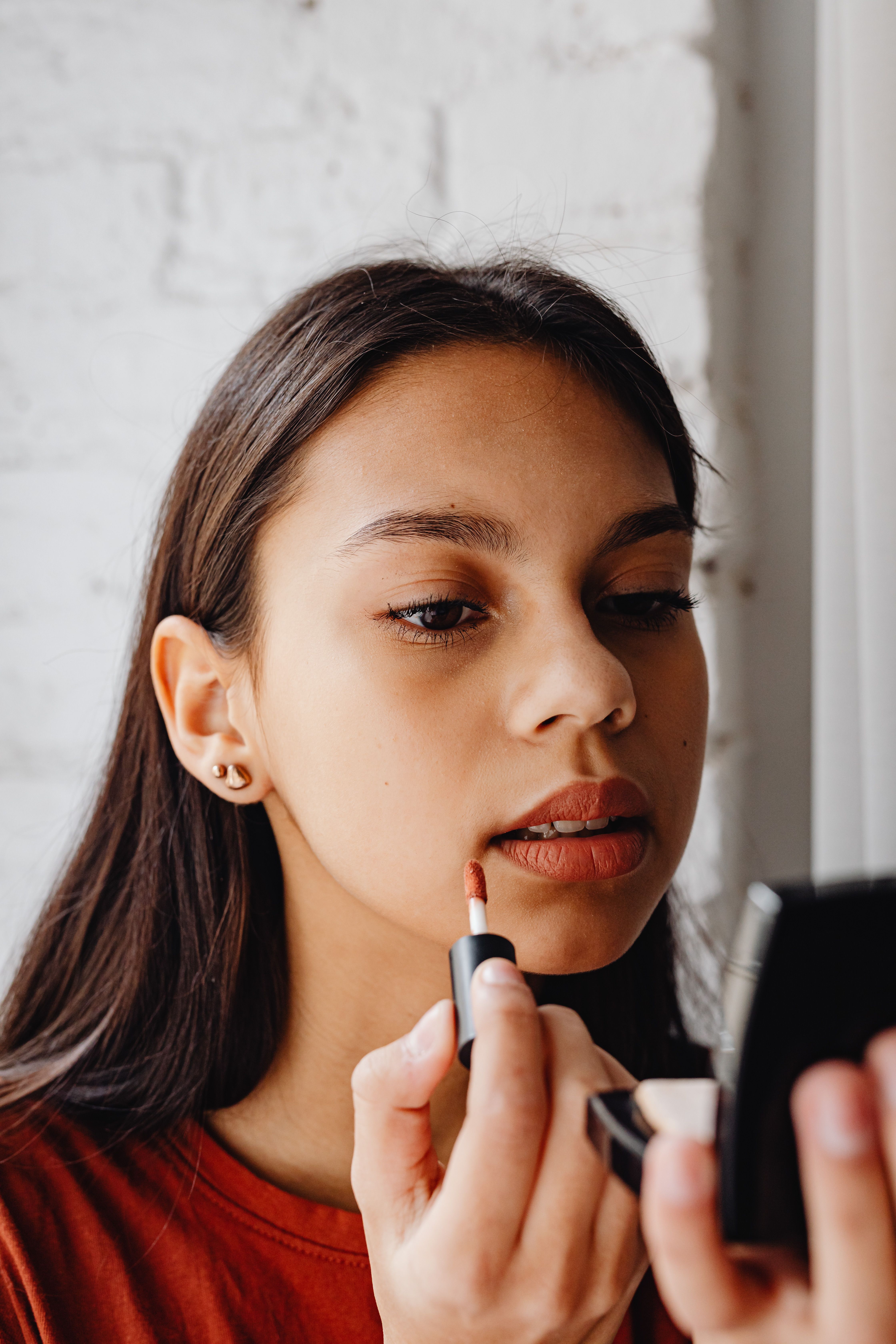Close-Up Shot of a Teenage Girl Putting on Eyeshadow Makeup · Free ...