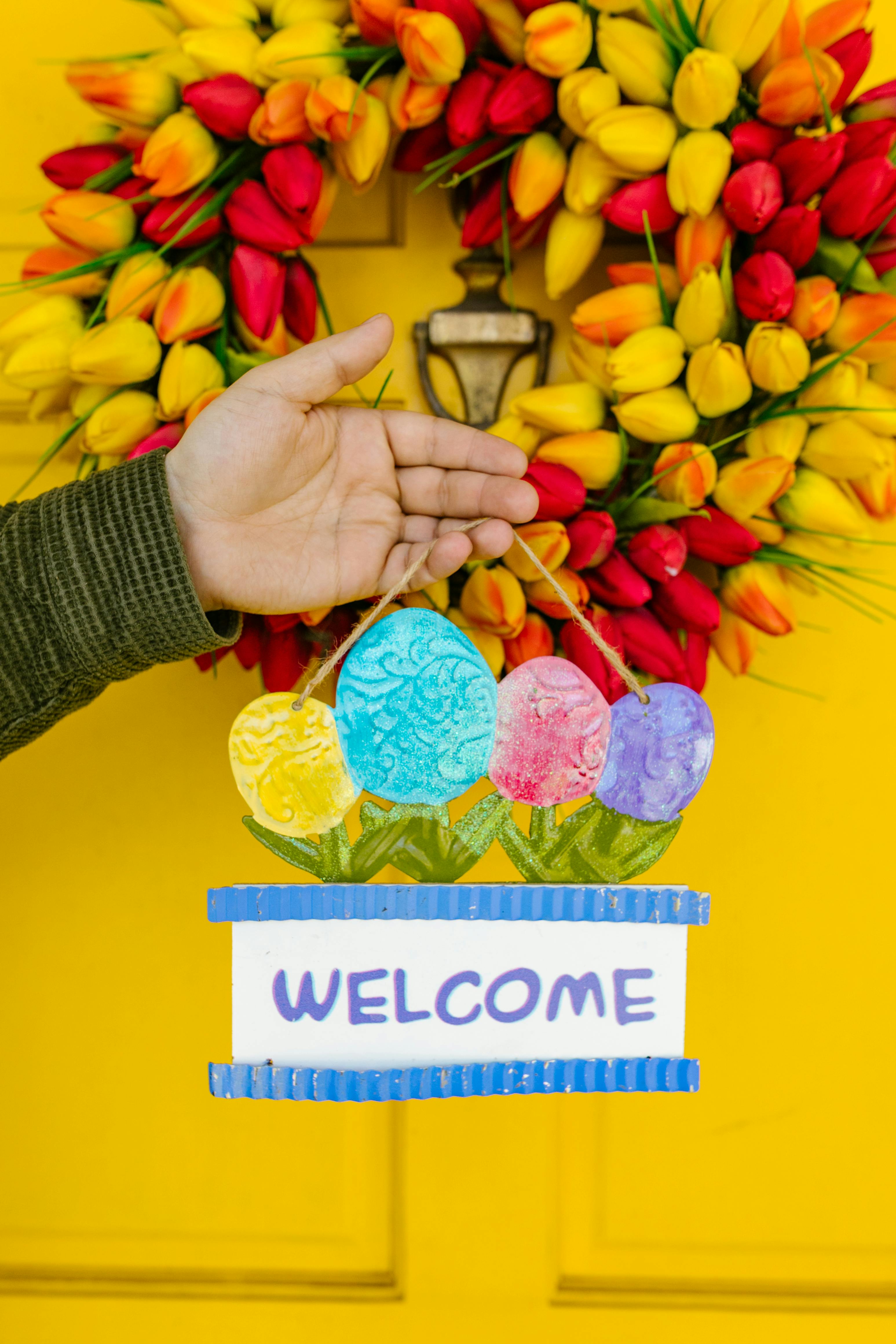 A Person Holding Welcome Sign · Free Stock Photo