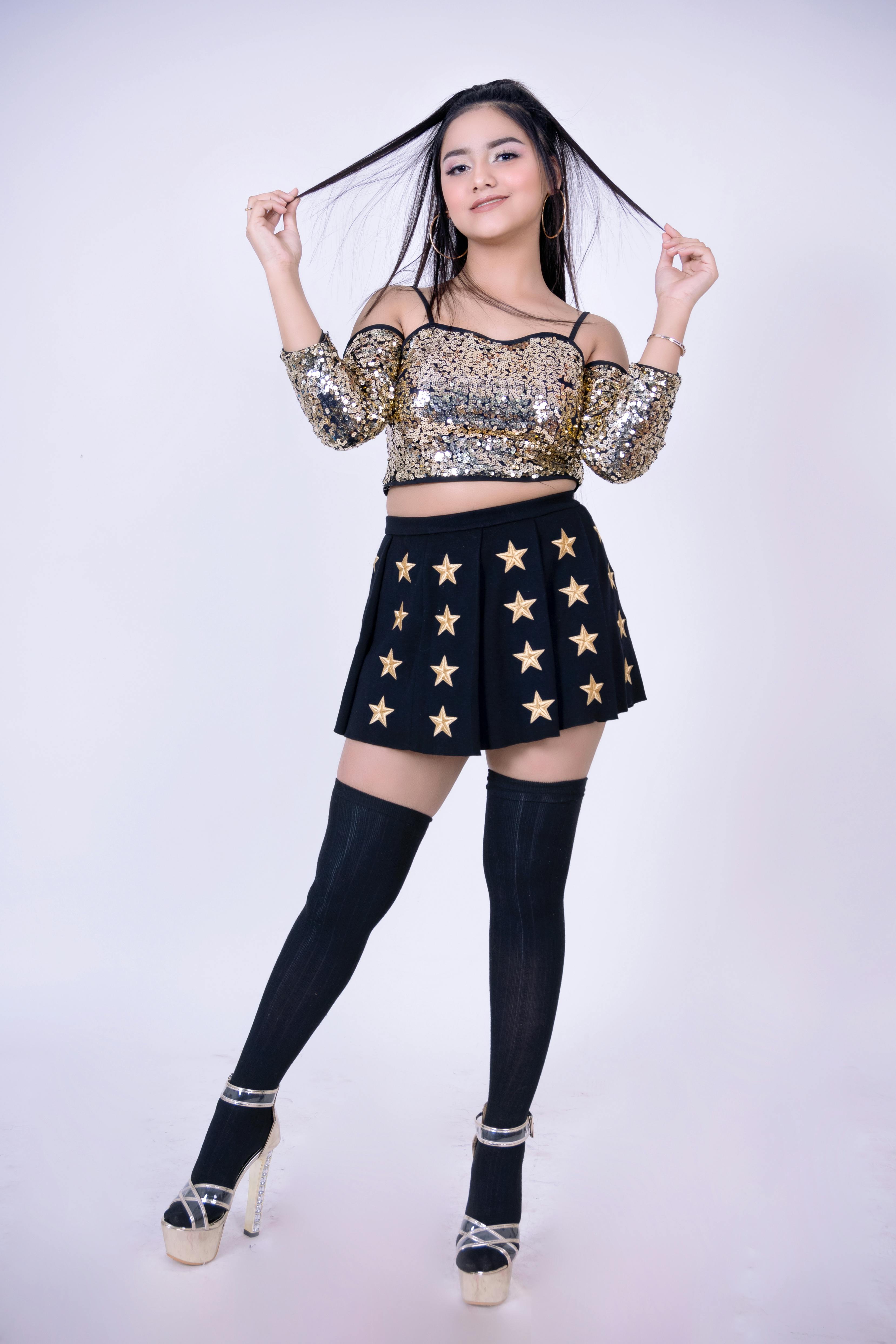 A Woman in Casual Wear Modeling · Free Stock Photo