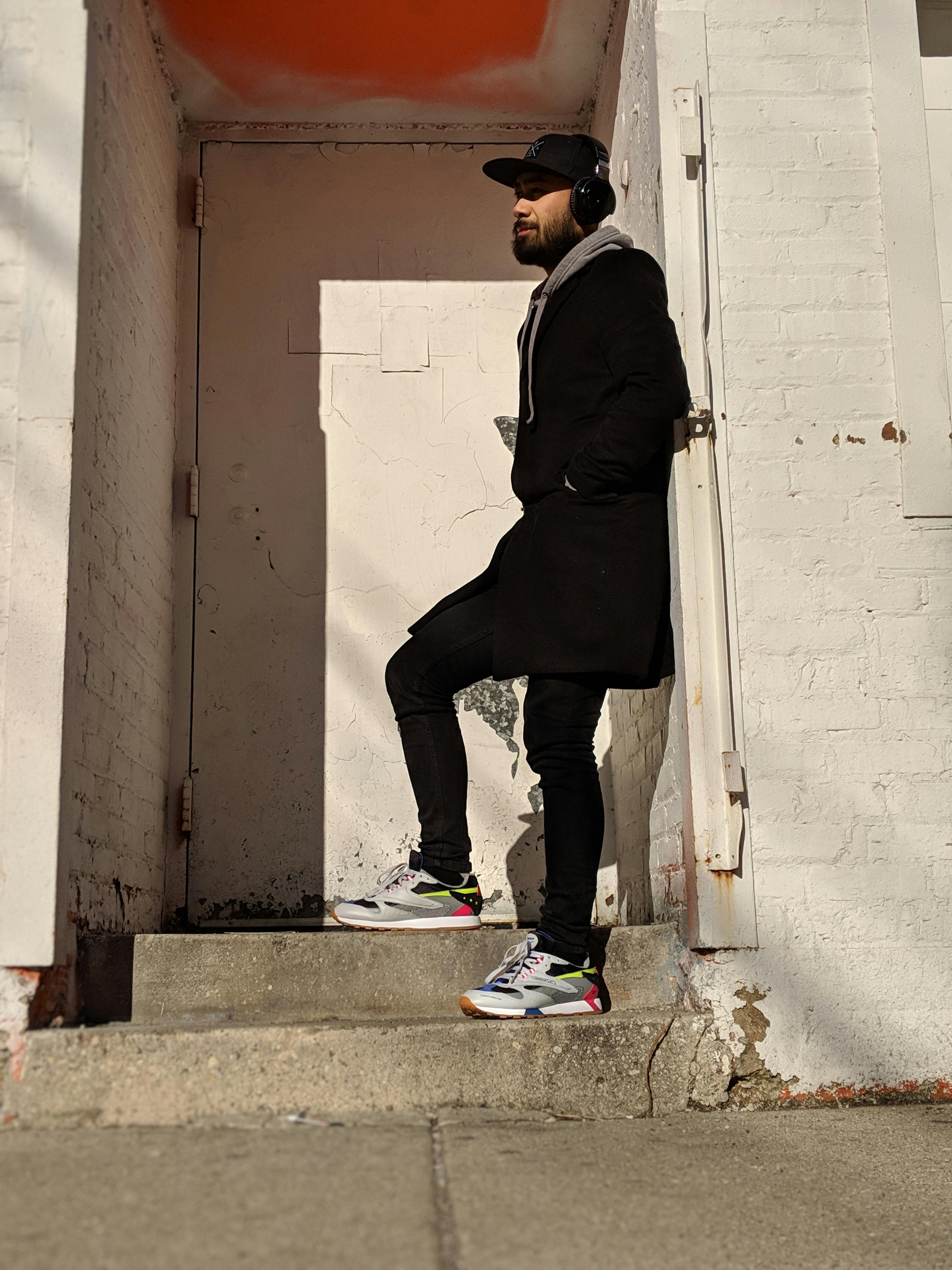 Four Male Models Posing on White Background · Free Stock Photo