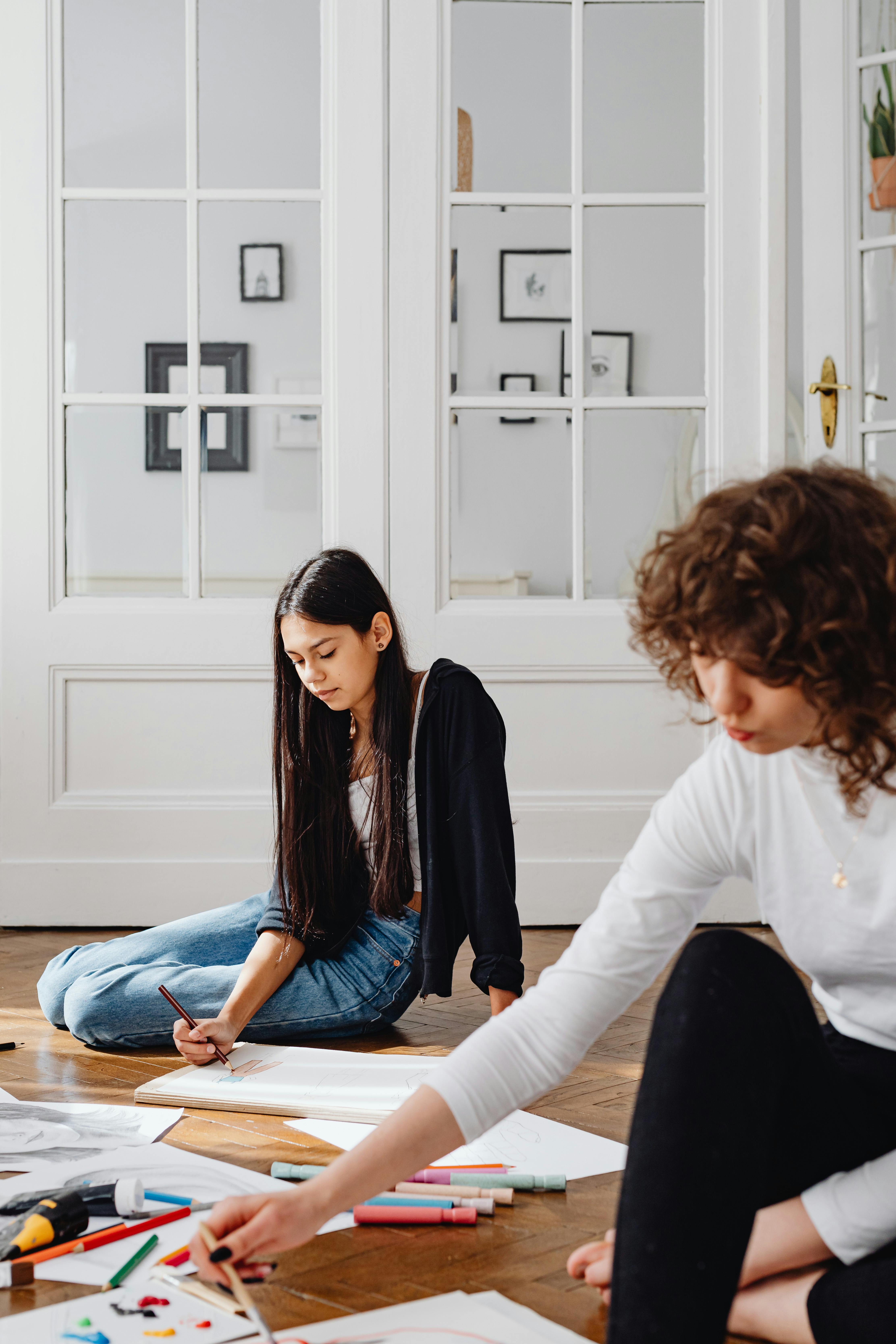 Photograph of Girls Drawing Together · Free Stock Photo