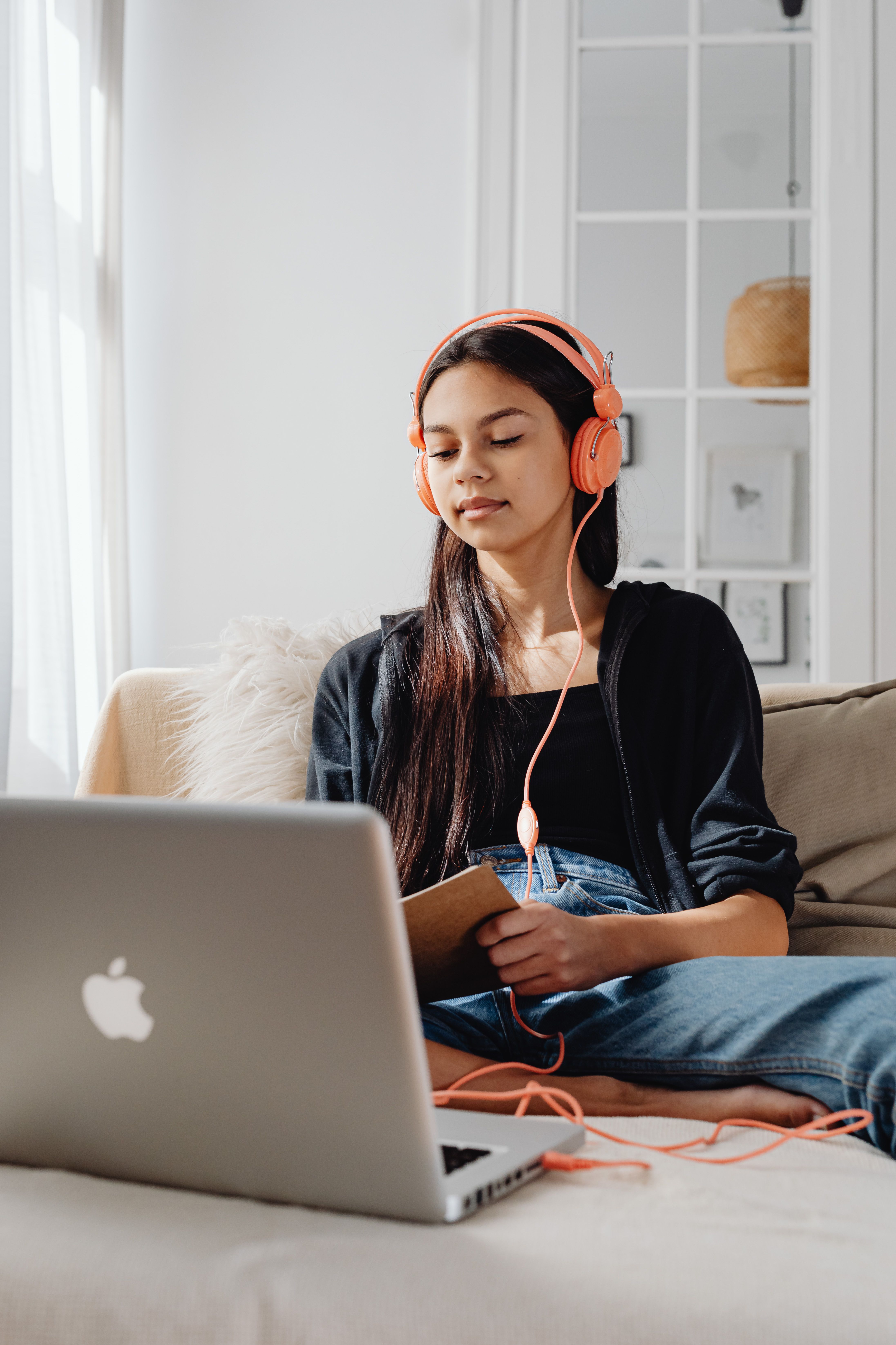 A Woman using Headphones · Free Stock Photo