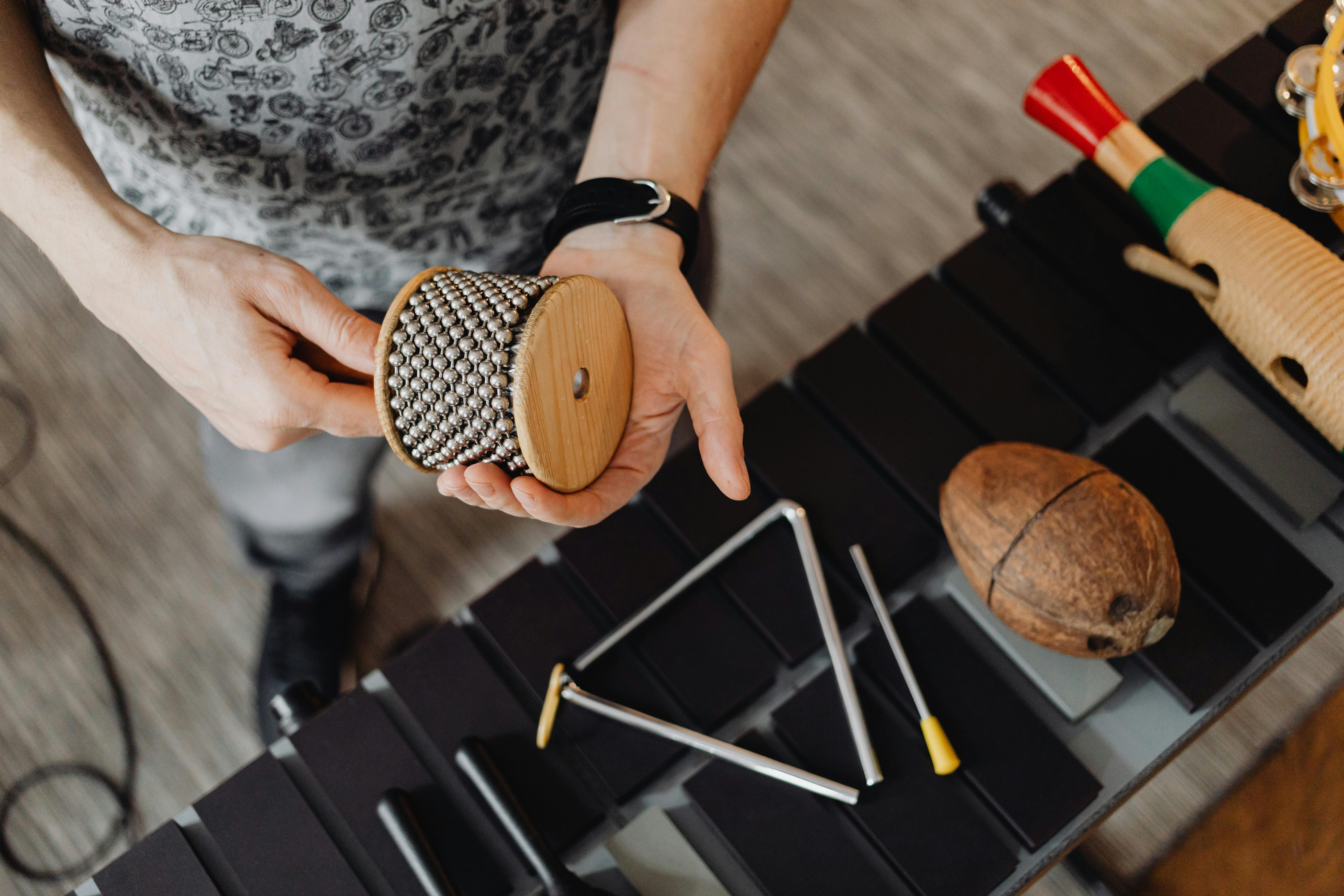 A Man Playing the Cabasa · Free Stock Photo
