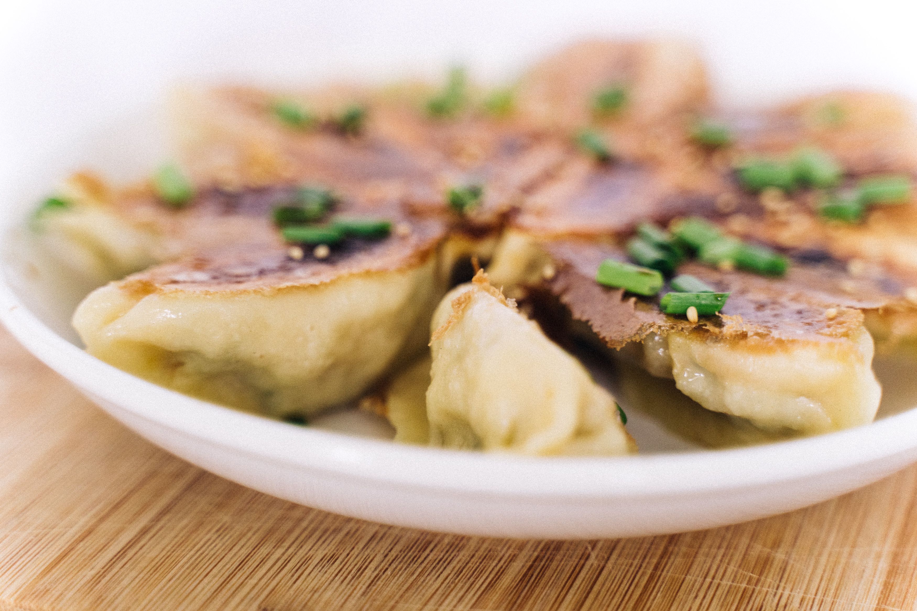 Steamed Dumplings on a Ceramic Plate · Free Stock Photo
