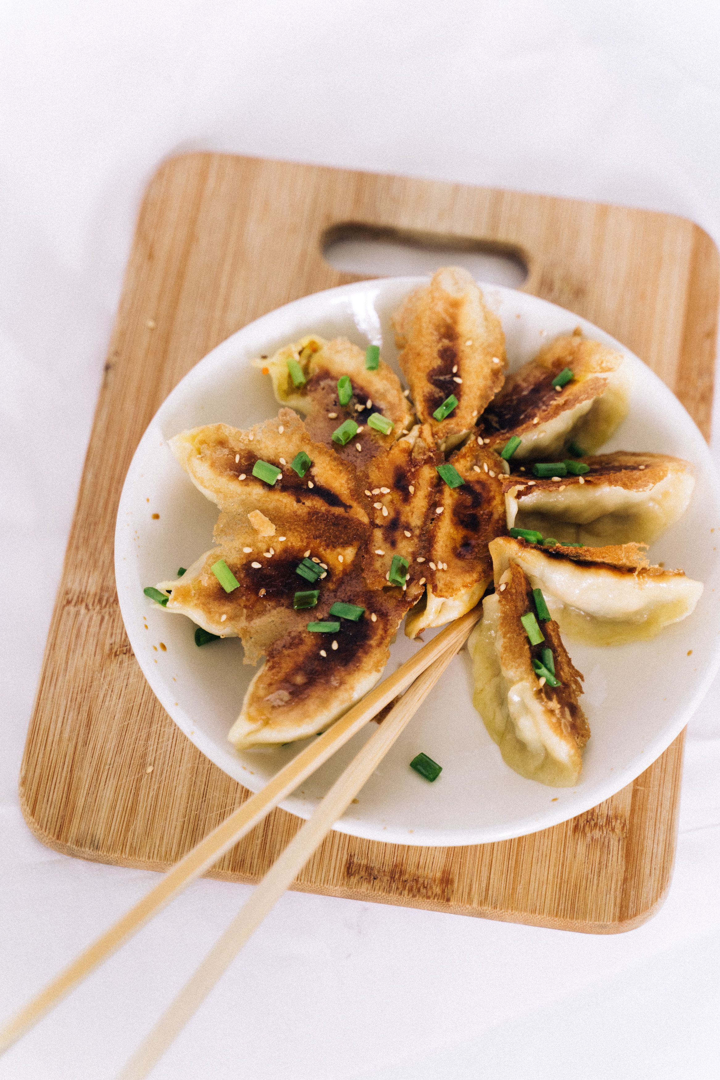 Delicious Crispy Dumplings on a Ceramic Plate · Free Stock Photo