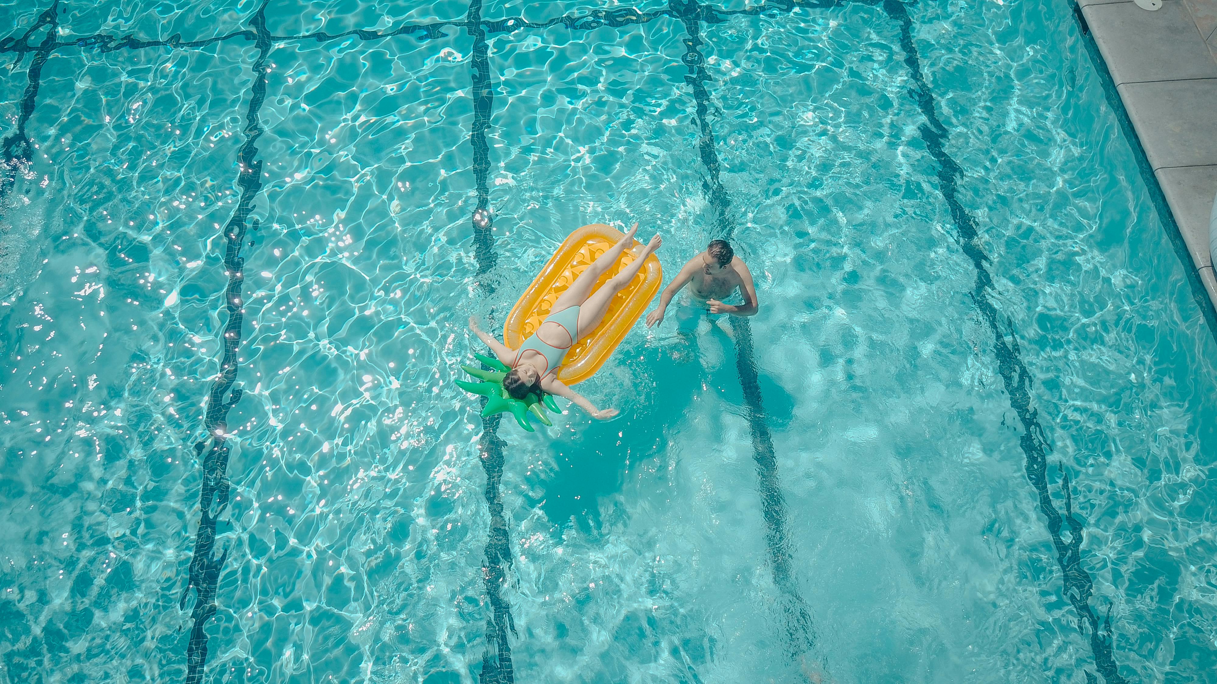 Top View of People in the Swimming Pool · Free Stock Photo