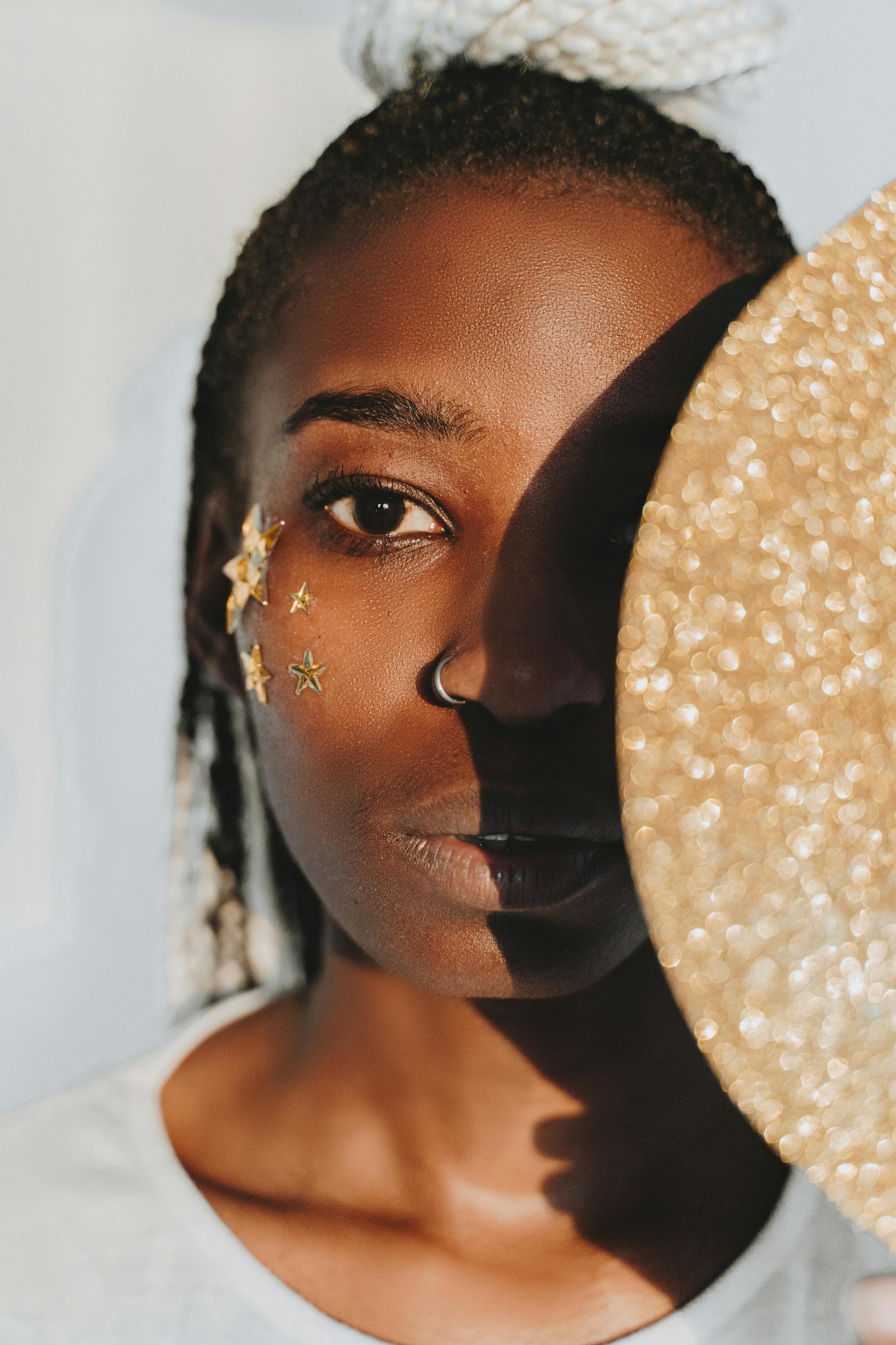 Woman with Star Cutouts on her Face · Free Stock Photo