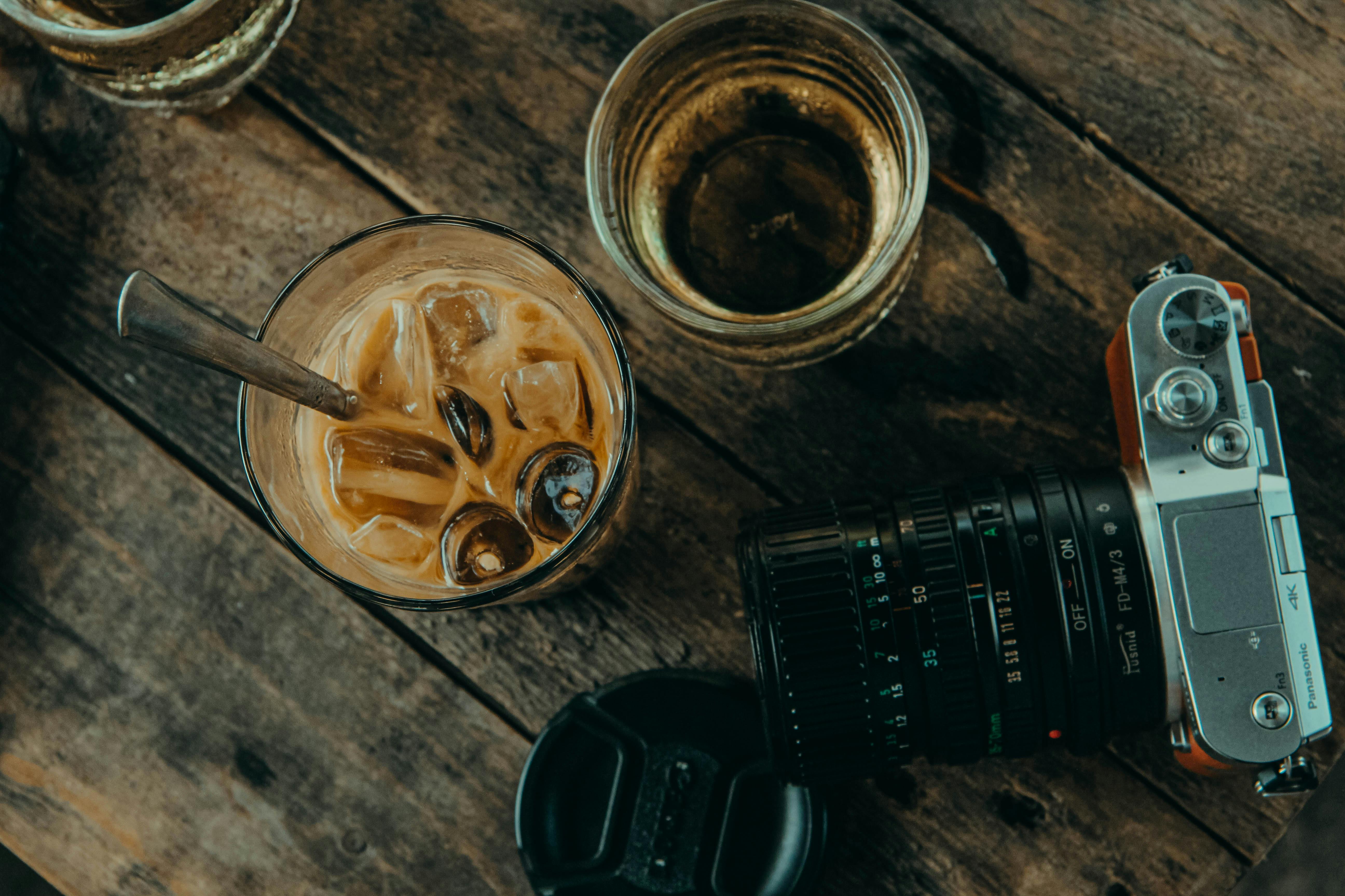 Black Camera on Wooden Table · Free Stock Photo