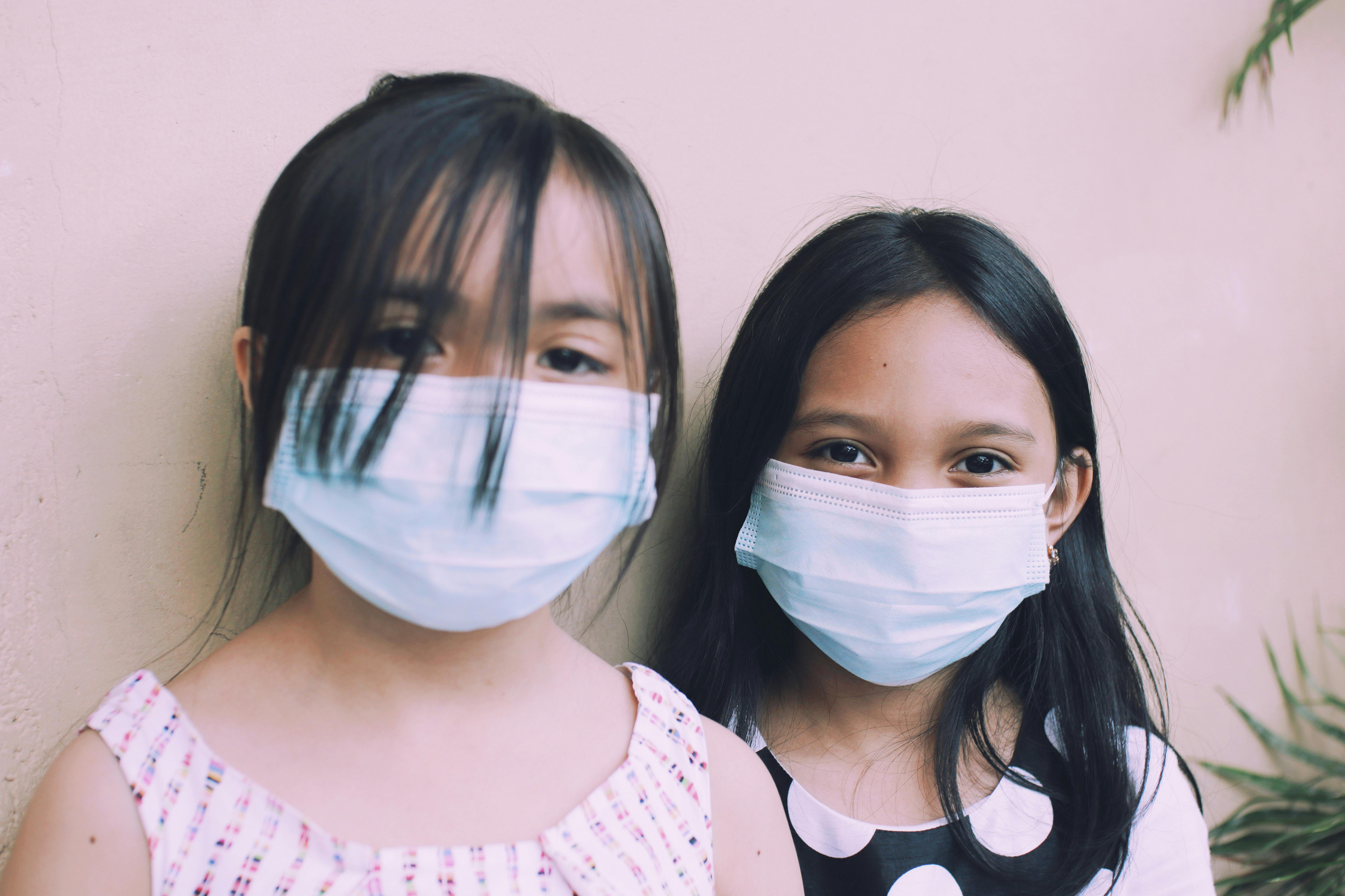 Close-Up Photo of Two Girls Wearing Their Face Masks · Free Stock Photo
