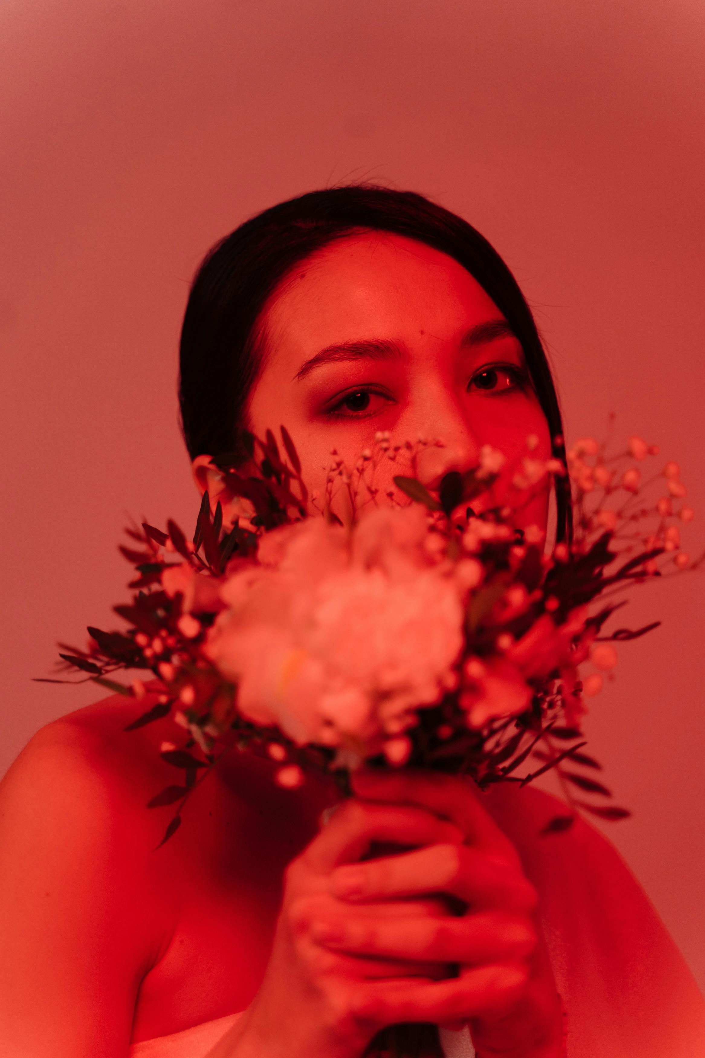Woman With White Flowers Covering Face · Free Stock Photo