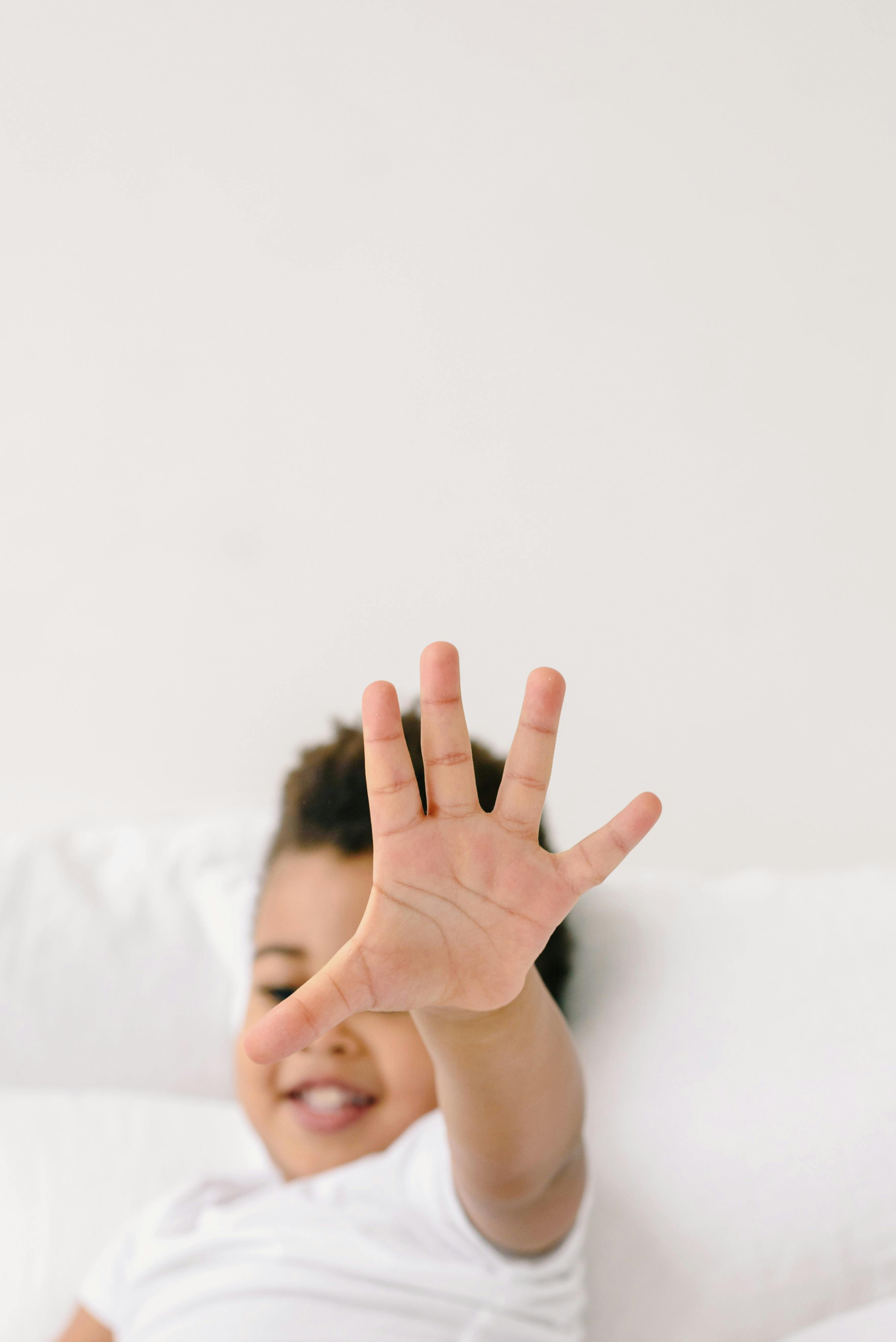 A Boy Showing His Palm · Free Stock Photo