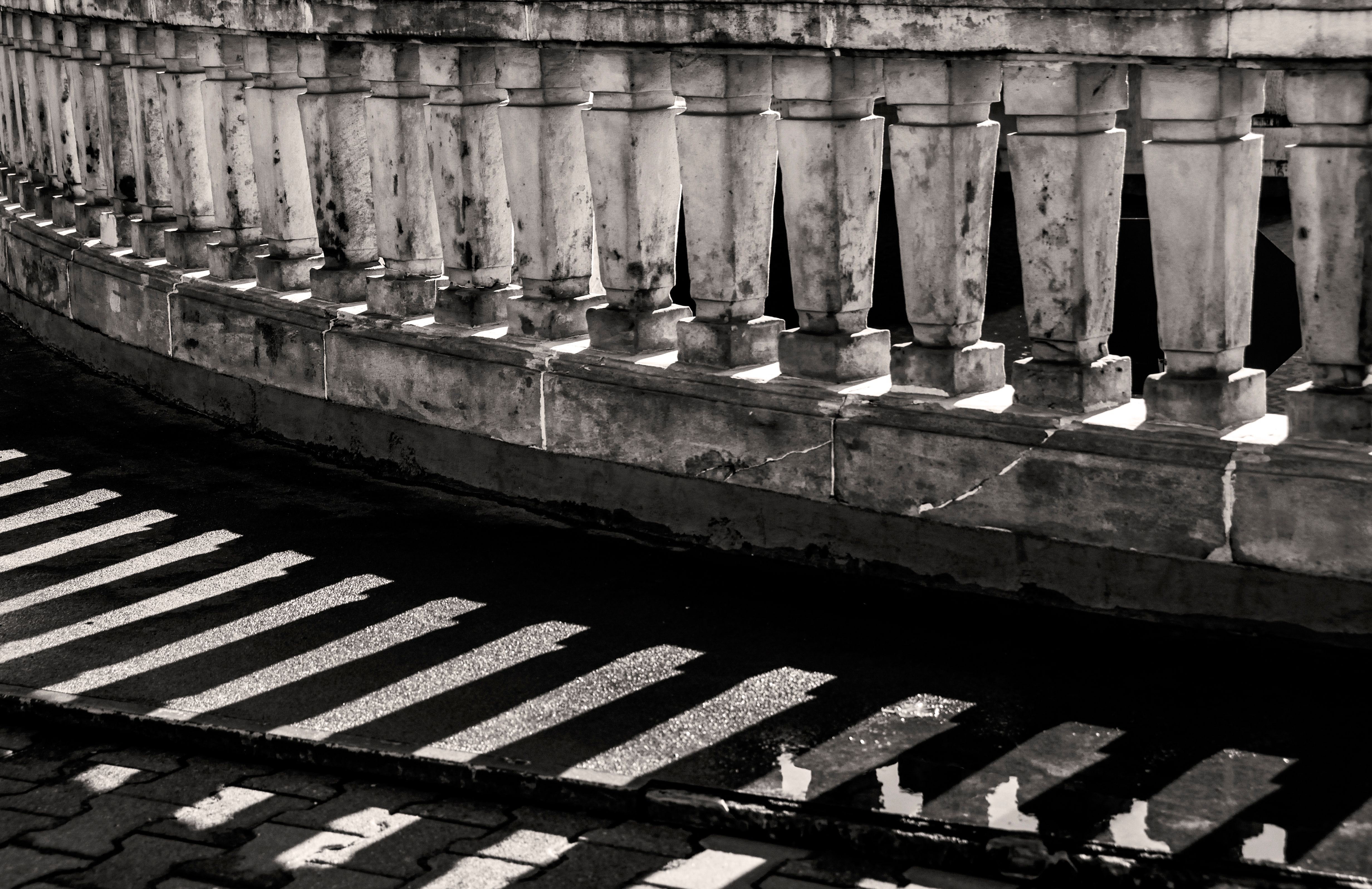 Marble Fence Bedrocks Shadow on Ground · Free Stock Photo