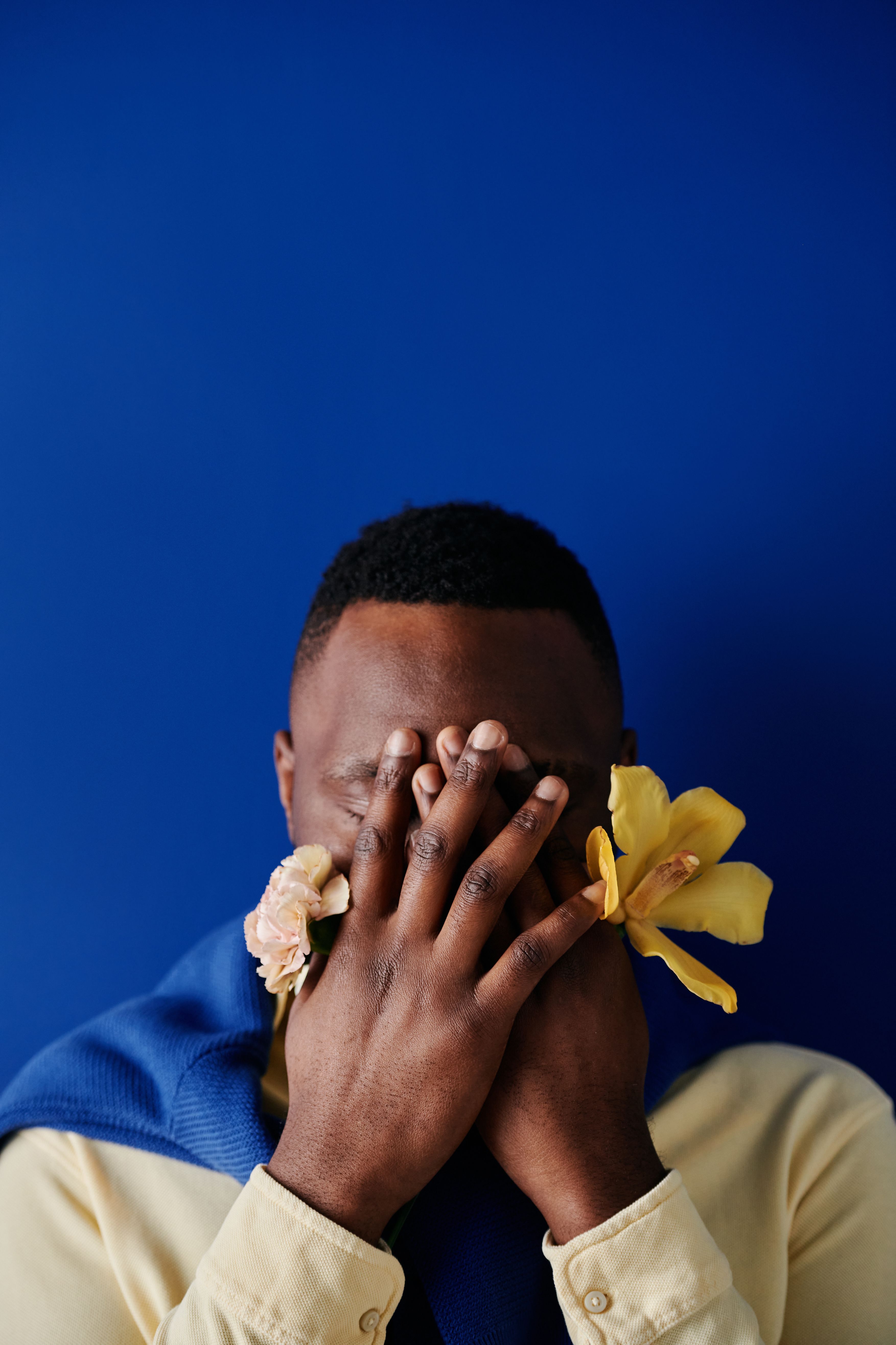A Man Covering his Face · Free Stock Photo