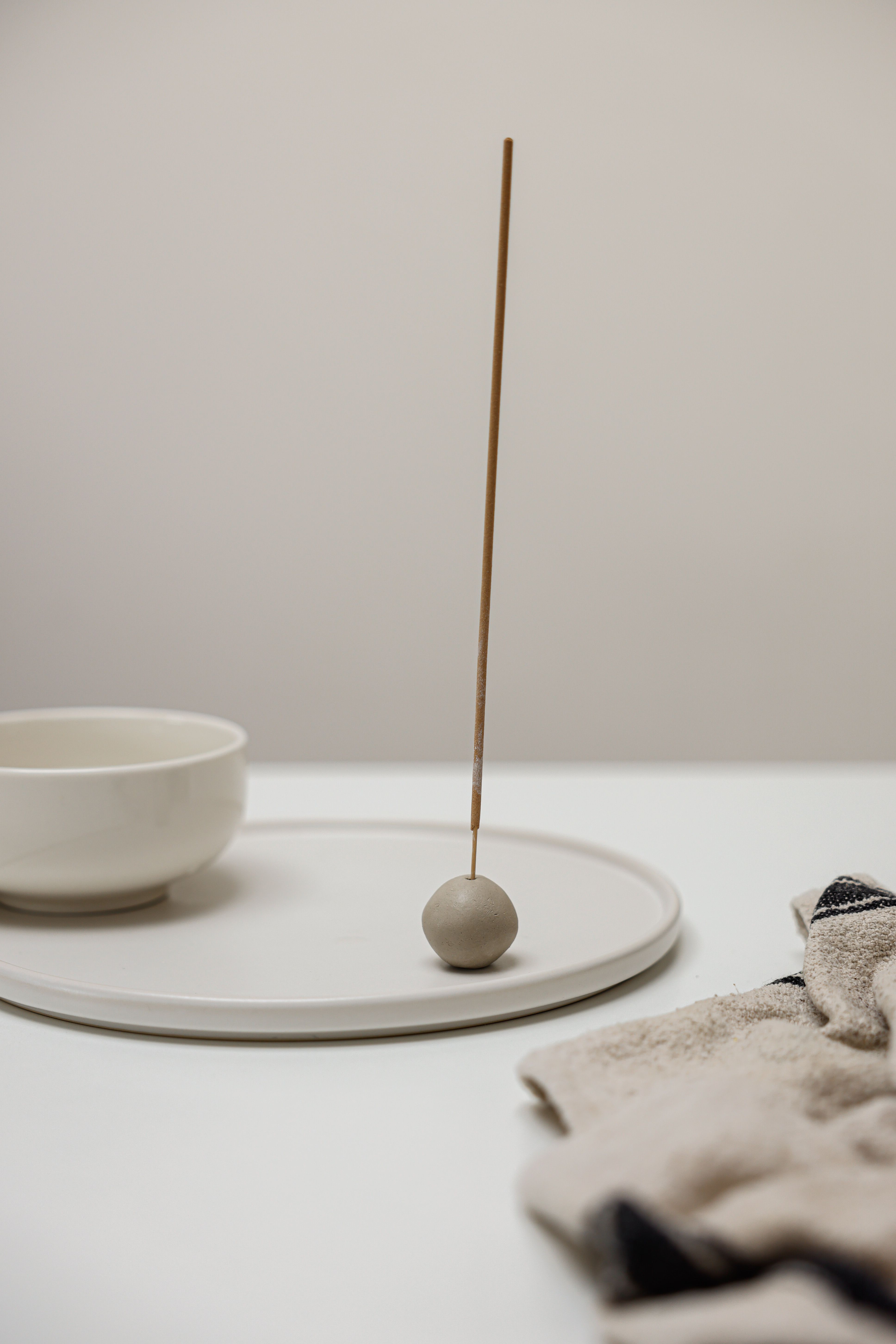 Close-up Photo of a Rounded Clay with Stick · Free Stock Photo
