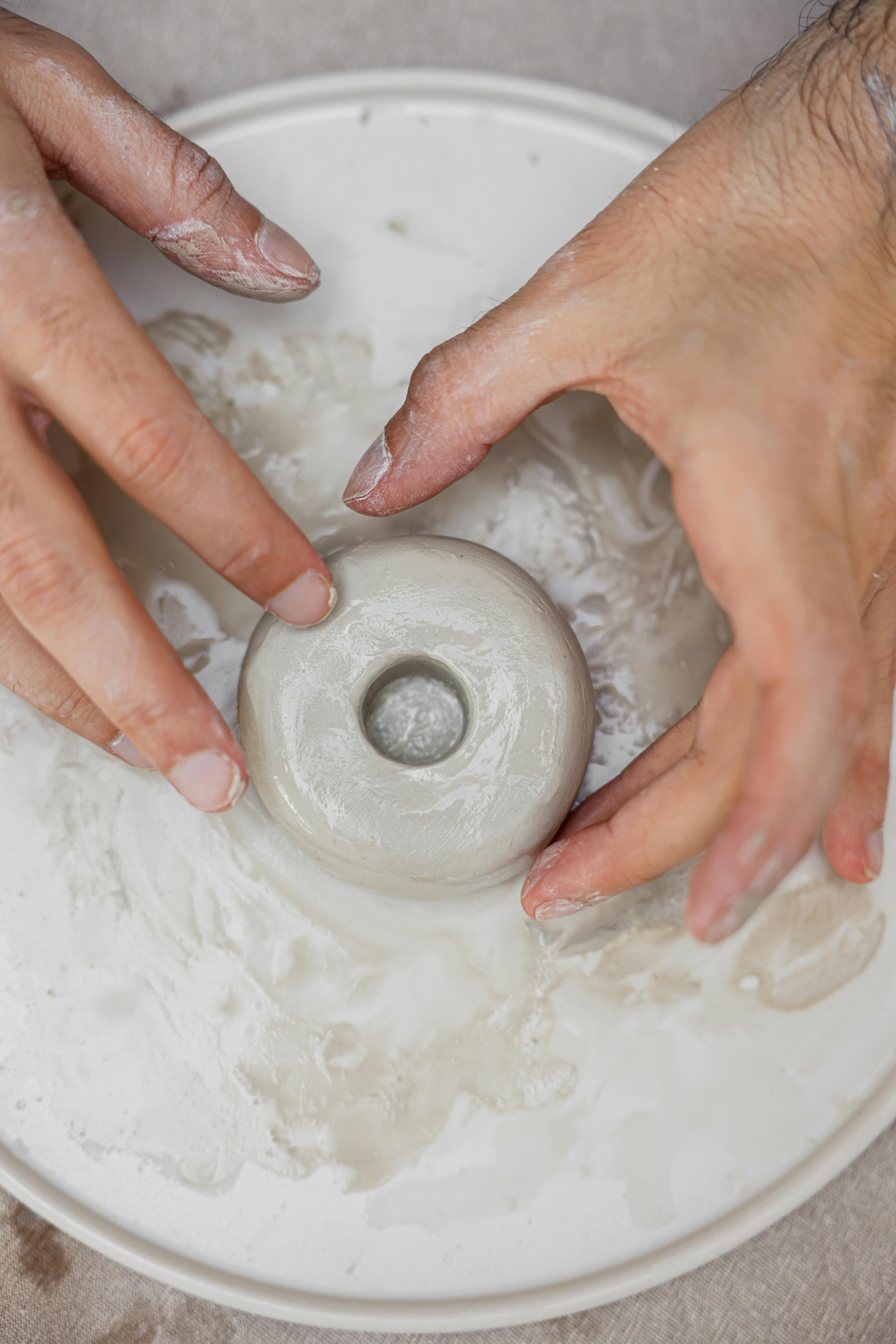 Close-up of a Man Crafting from Clay · Free Stock Photo
